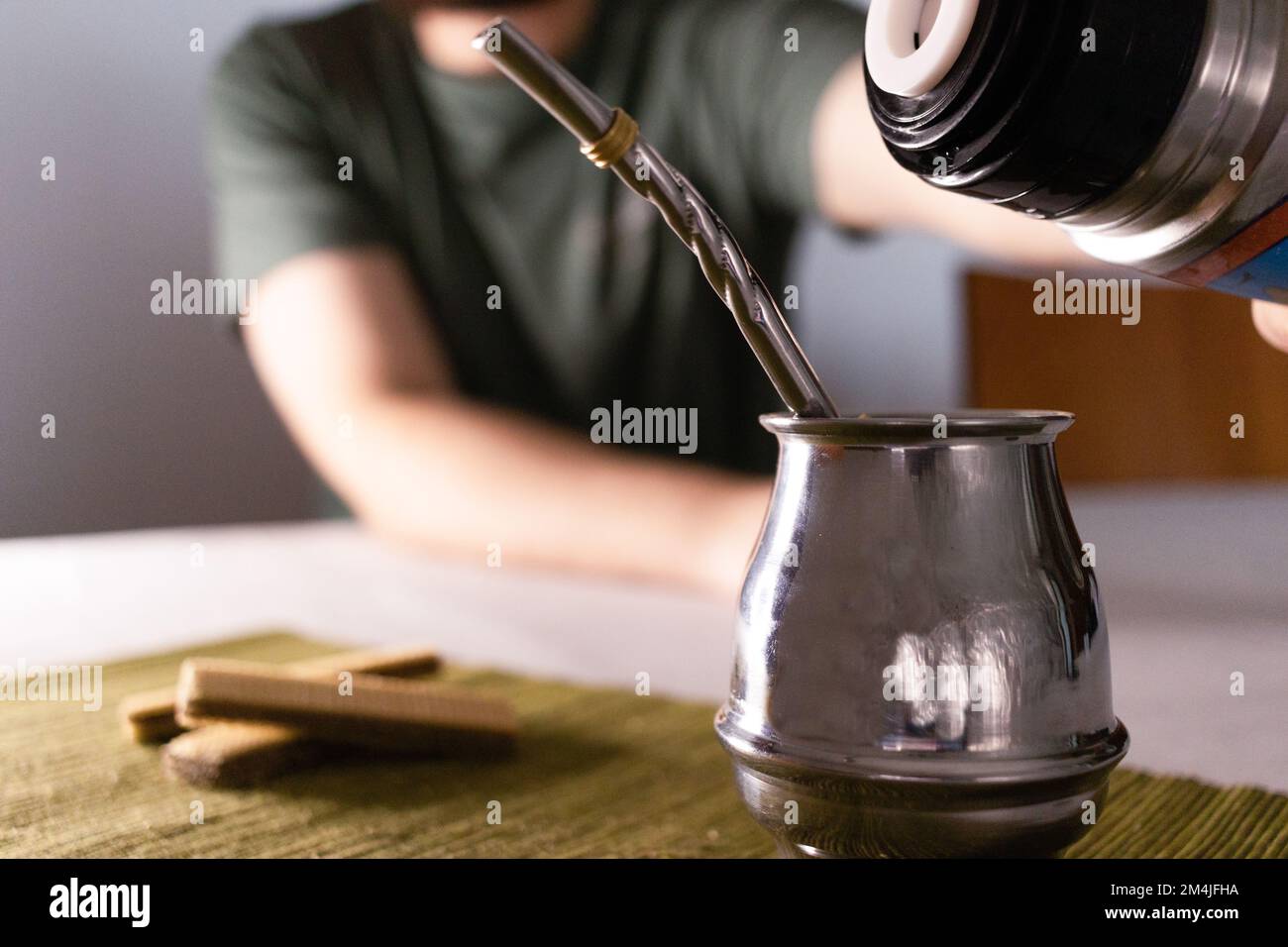 Argentinian Caucasian man preparing a mate Stock Photo - Alamy