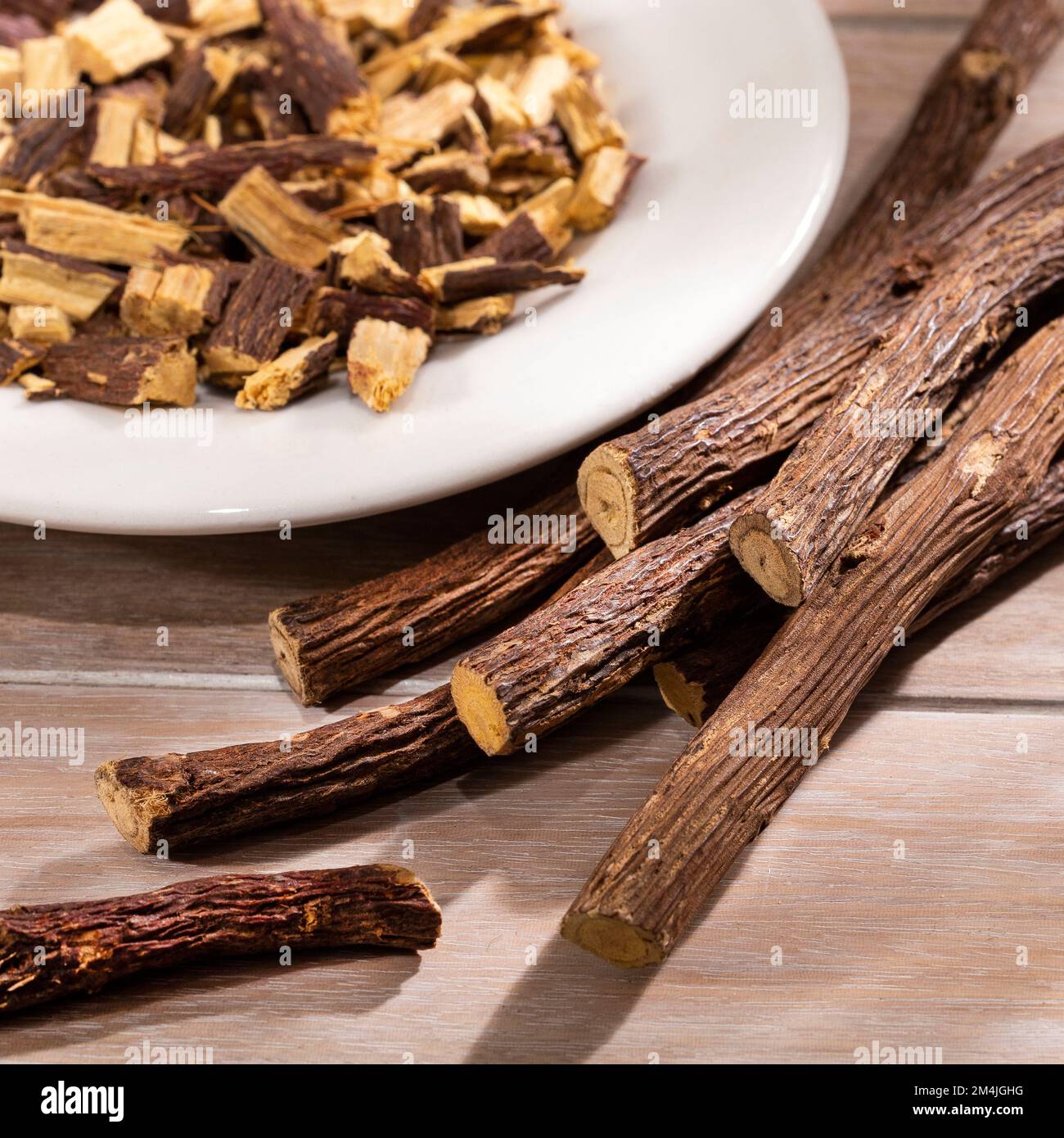 Glycyrrhiza glabra - Dried medicinal licorice sticks Stock Photo - Alamy