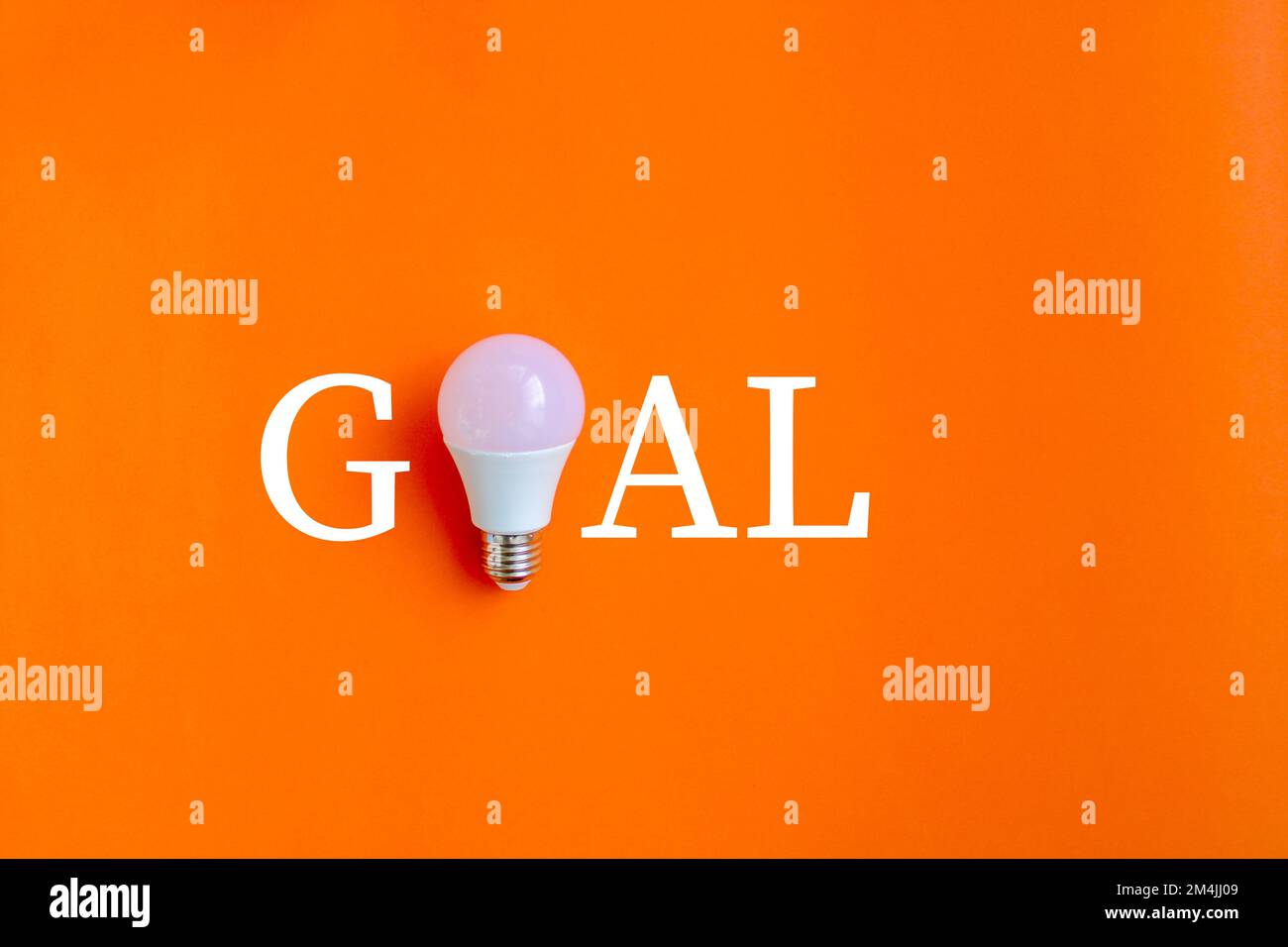 light bulb idea. Goal lettering created from led bulb on colored ...