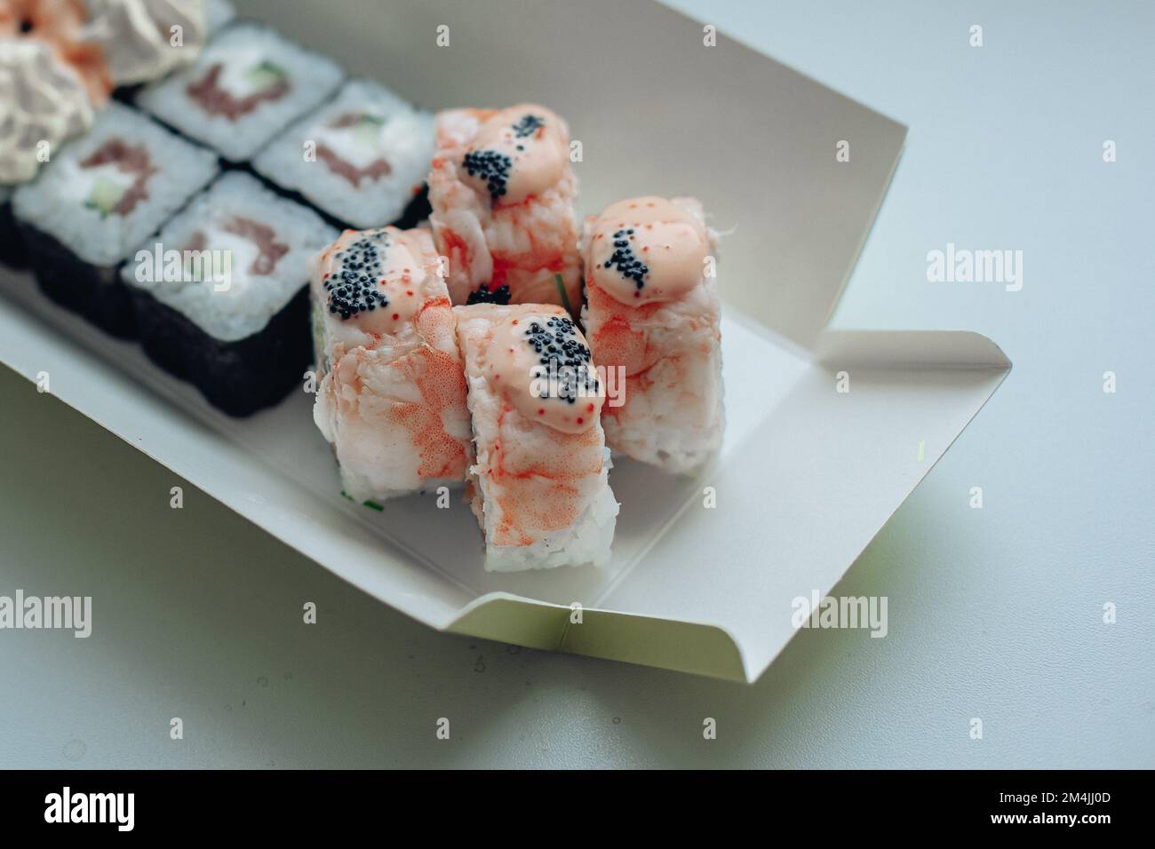 Beautiful delicious sushi. Sushi delivery. Advertising sushi rolls made ...