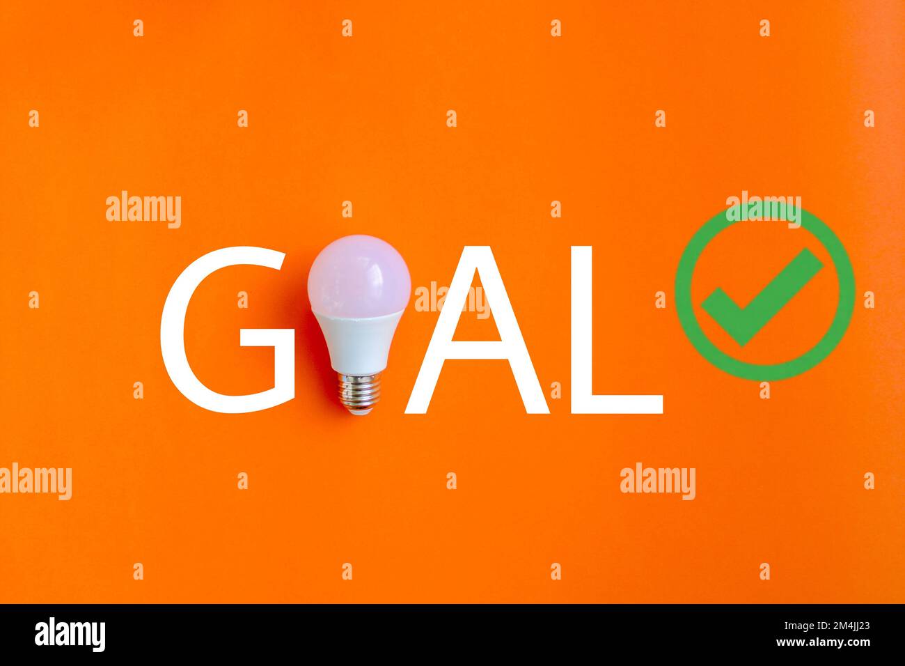 light bulb idea. Goal lettering created from led bulb on colored ...