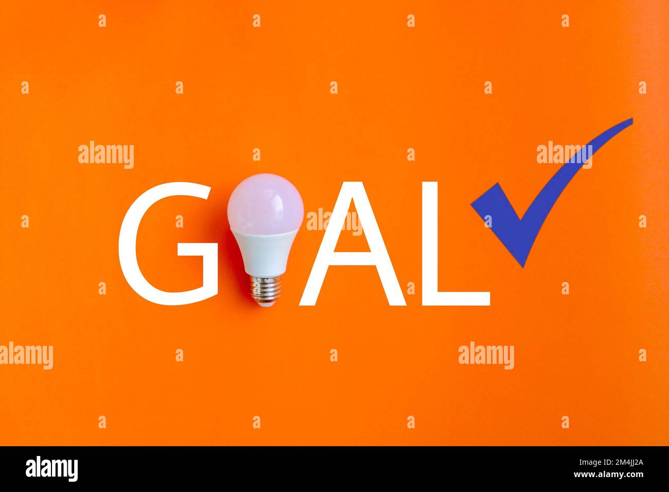 light bulb idea. Goal lettering created from led bulb on colored ...