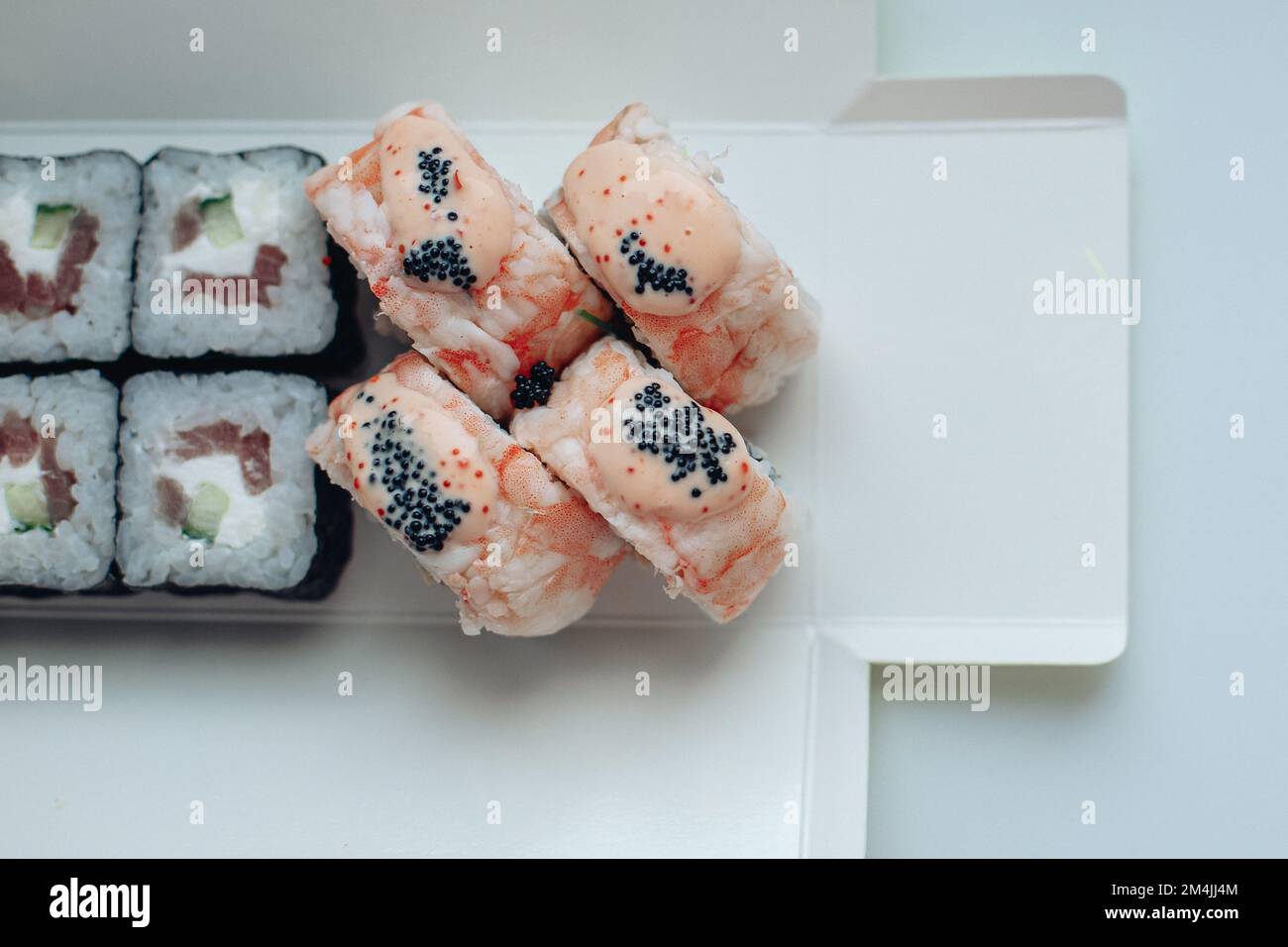 Beautiful delicious sushi. Sushi delivery. Advertising sushi rolls made ...