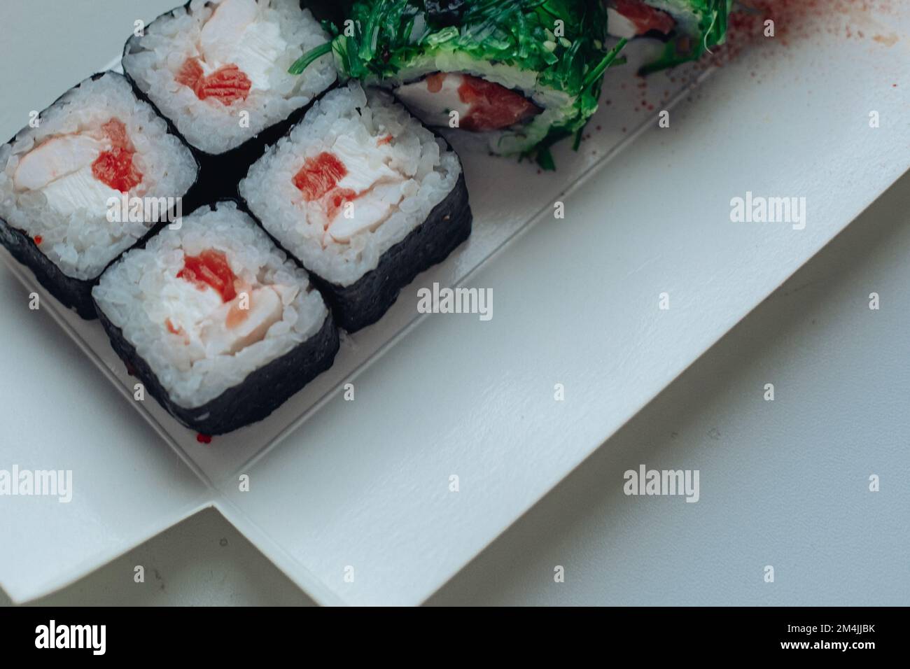 Beautiful delicious sushi. Sushi delivery. Advertising sushi rolls made ...