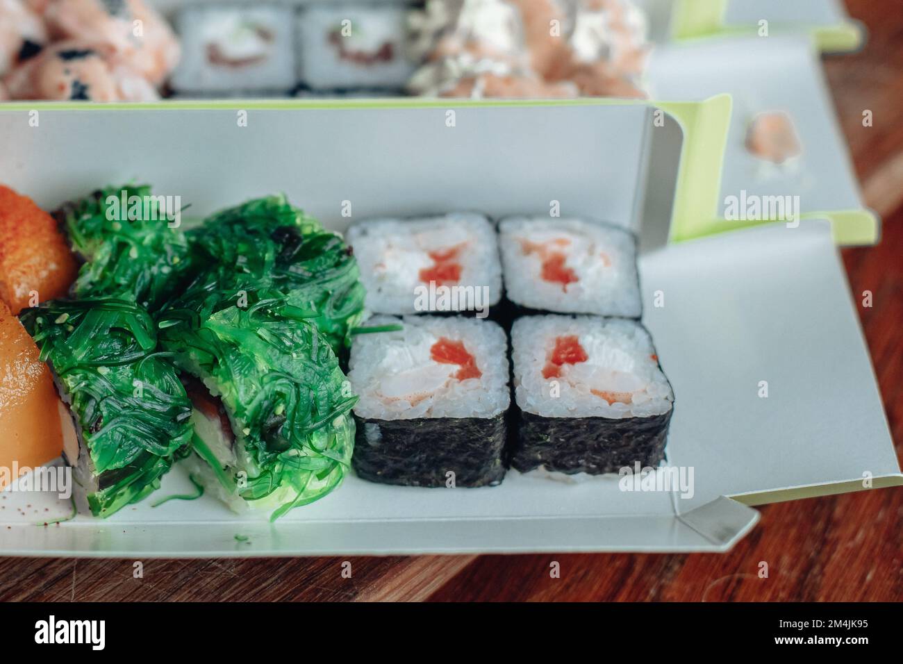 Beautiful delicious sushi. Sushi delivery. Advertising sushi rolls made ...