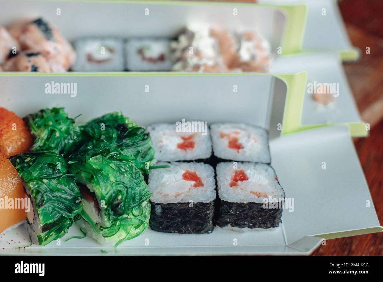 Beautiful delicious sushi. Sushi delivery. Advertising sushi rolls made ...