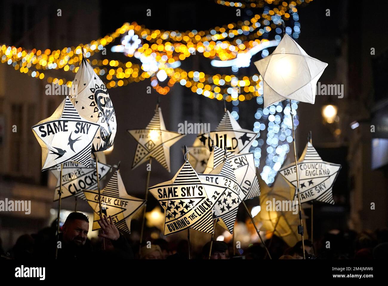 Participants carry lanterns during the 'Burning the Clocks' parade of ...