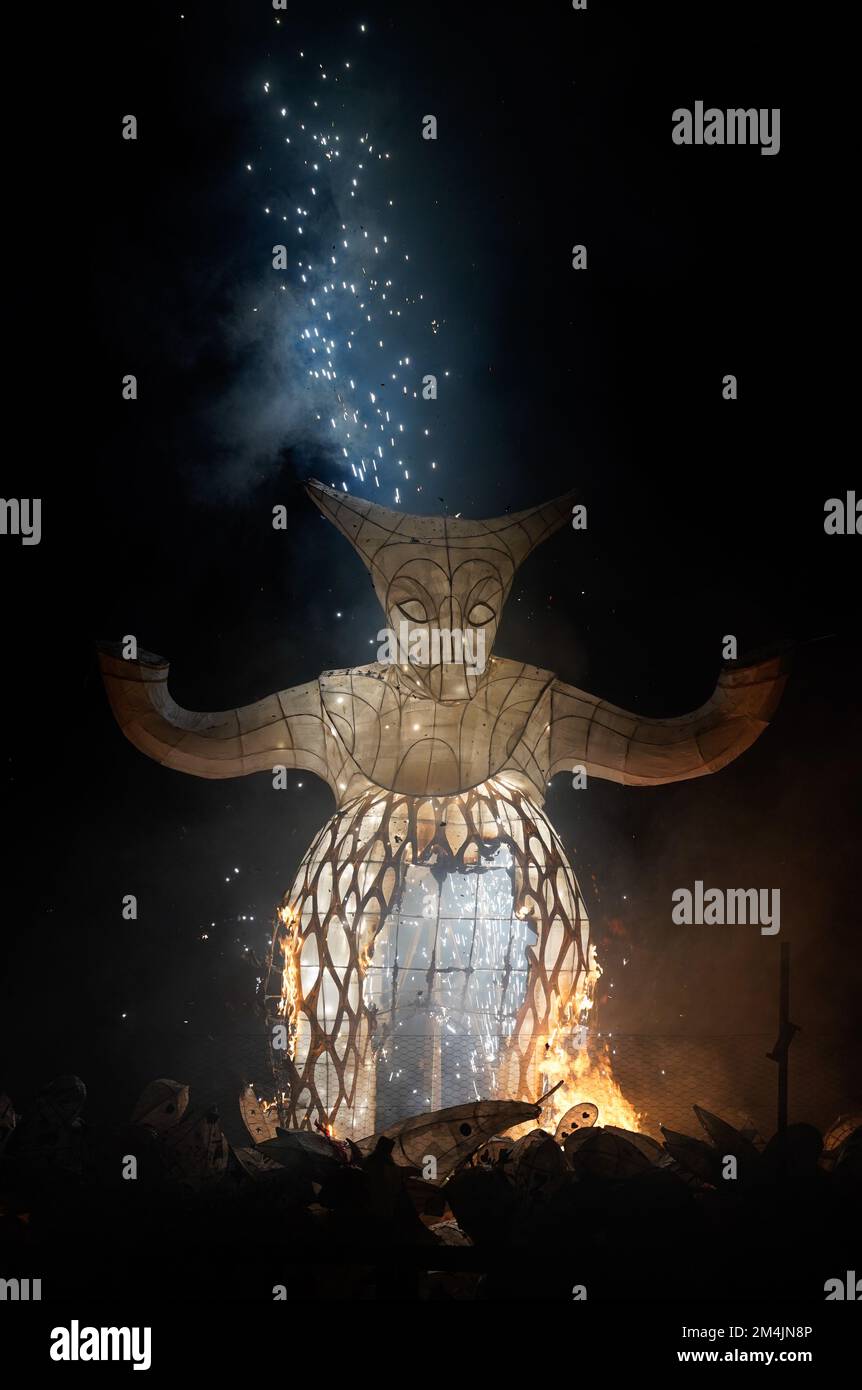 An effigy of the Wilderman is set on fire on the beach during the 'Burning the Clocks' parade of ...