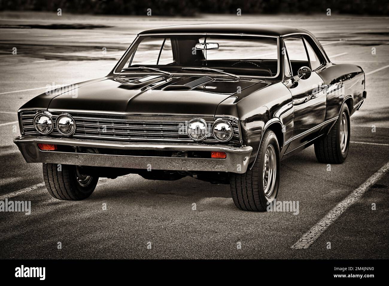 A sepia-toned photograph of a really well-done muscle car in brown tone ...