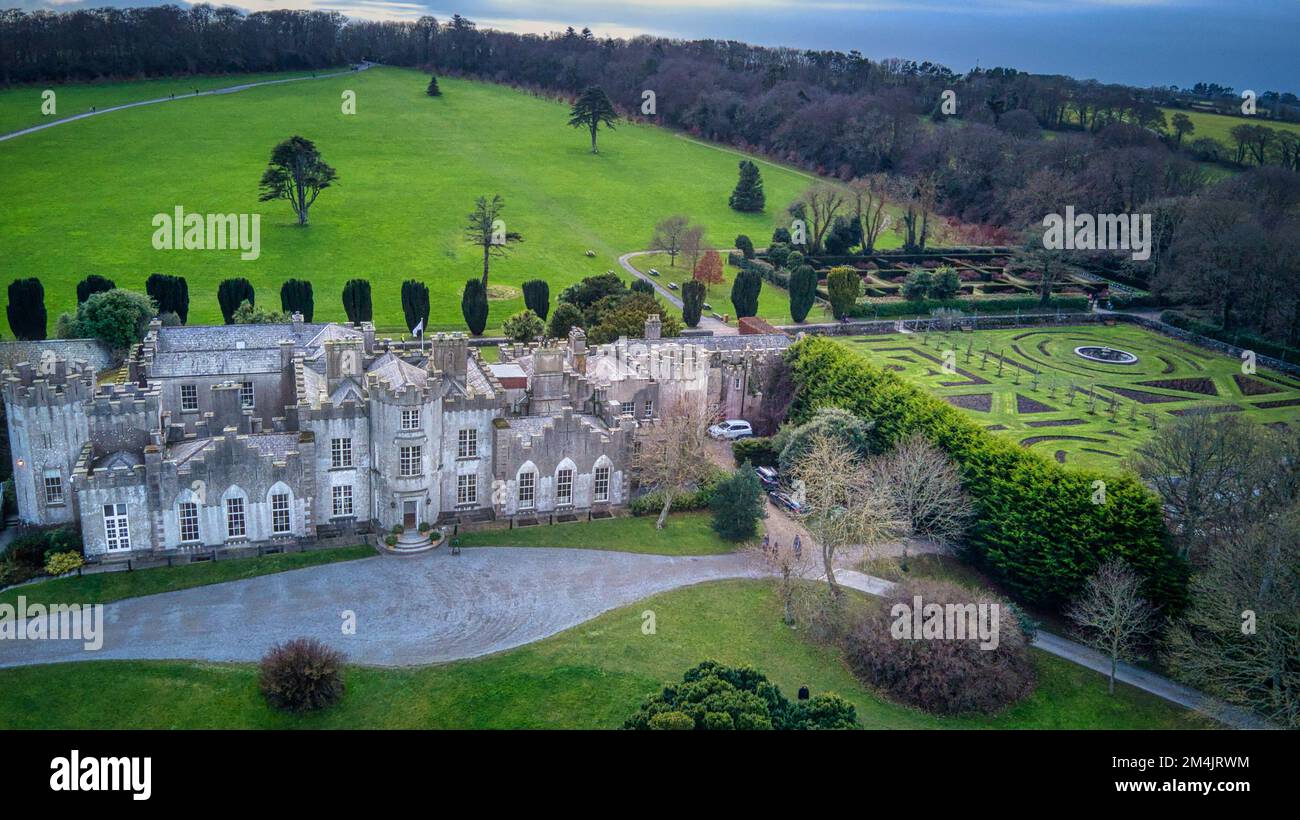 An aerial view of the buildings and gardens of Ardgillan Castle in ...
