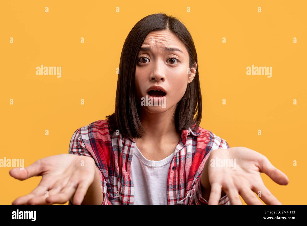 Unbelievable concept. Shocked korean woman with open mouth and palms ...