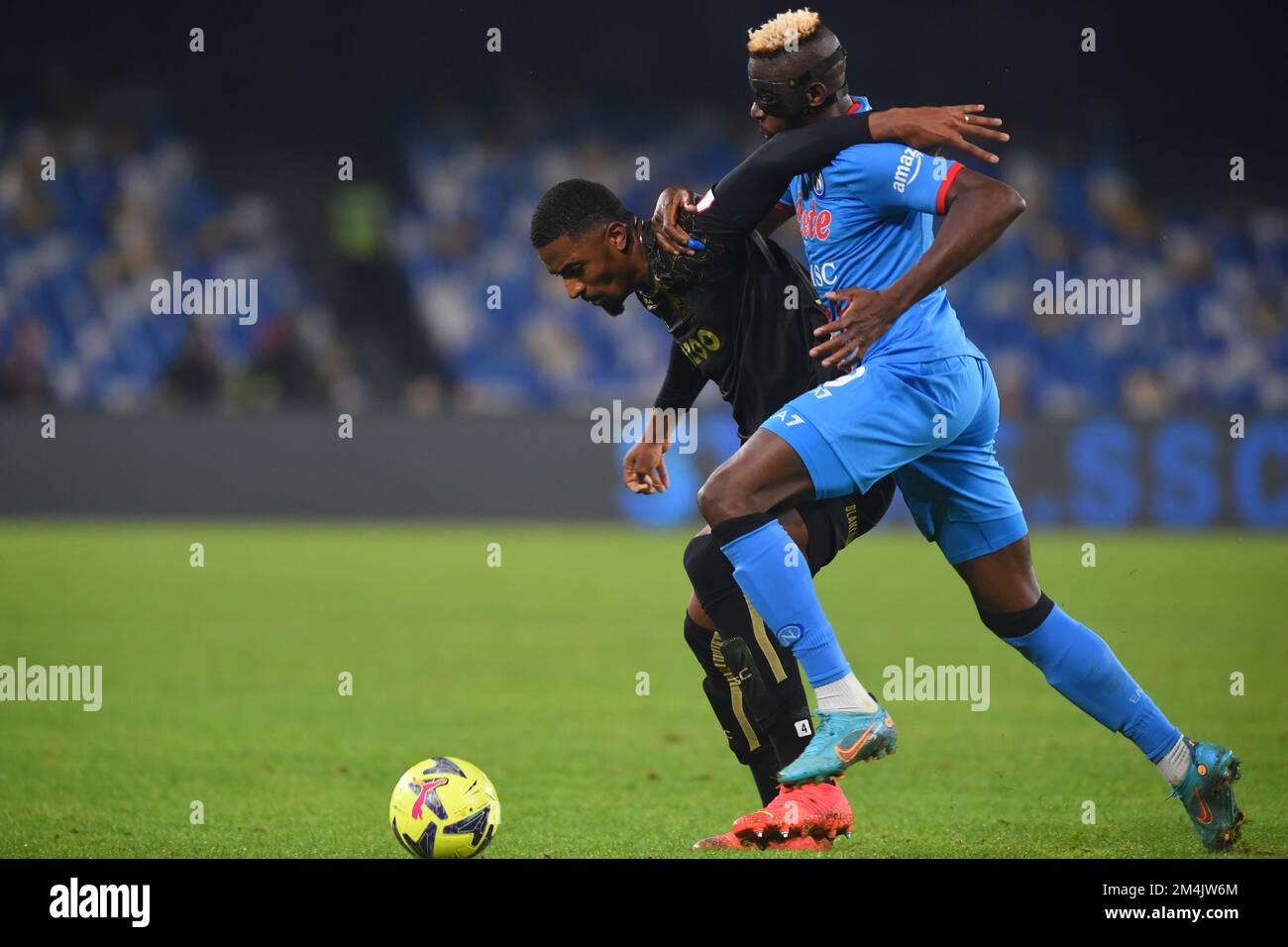 Victor Osimhen of SSC Napoli Alexsandro of Lille competes for the ball ...