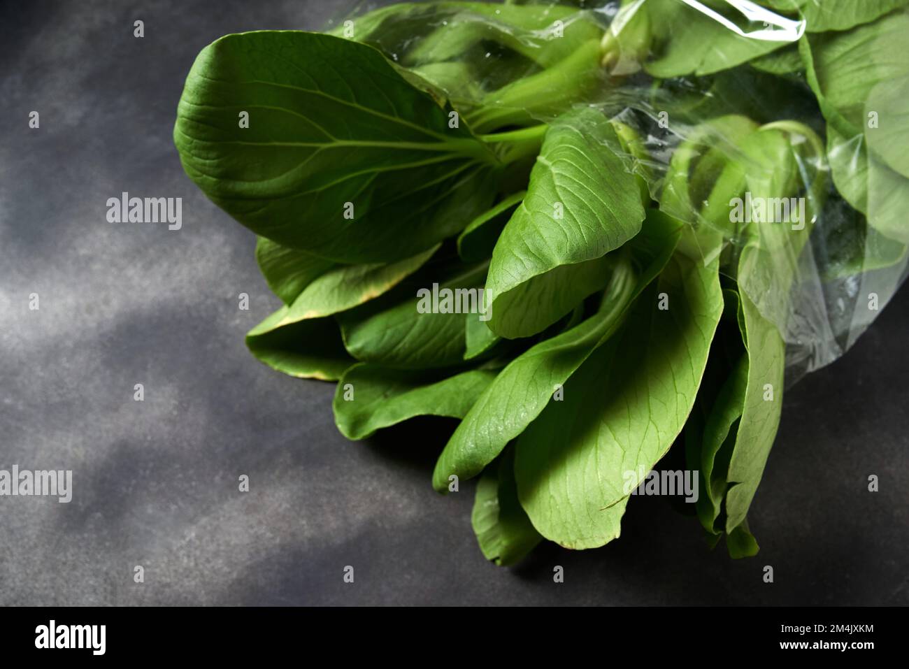 Green Pakchoi in a plastic bag Stock Photo - Alamy