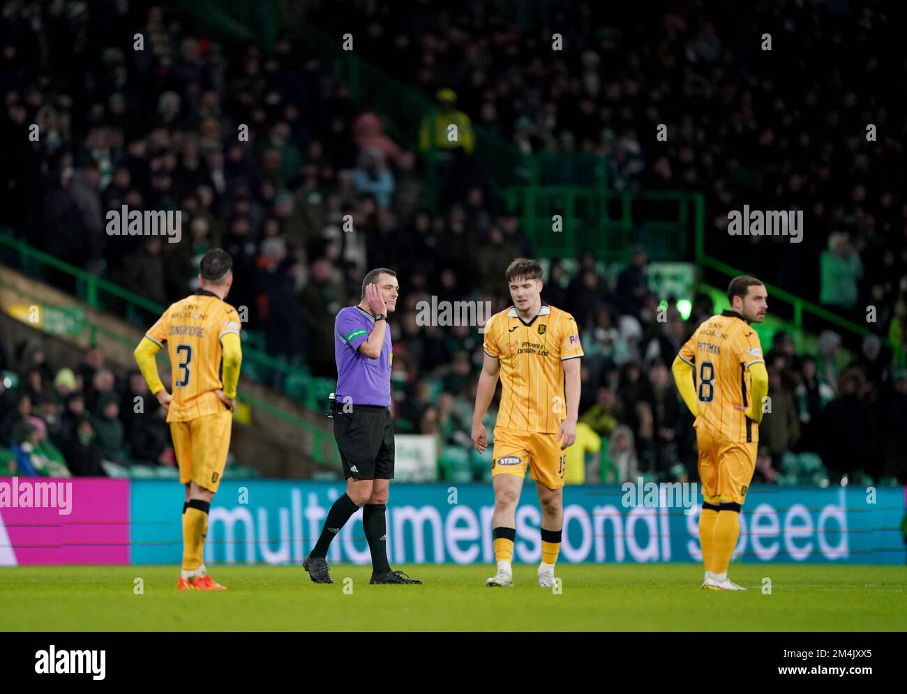 Referee Euan Anderson checks VAR during the cinch Premiership match at ...