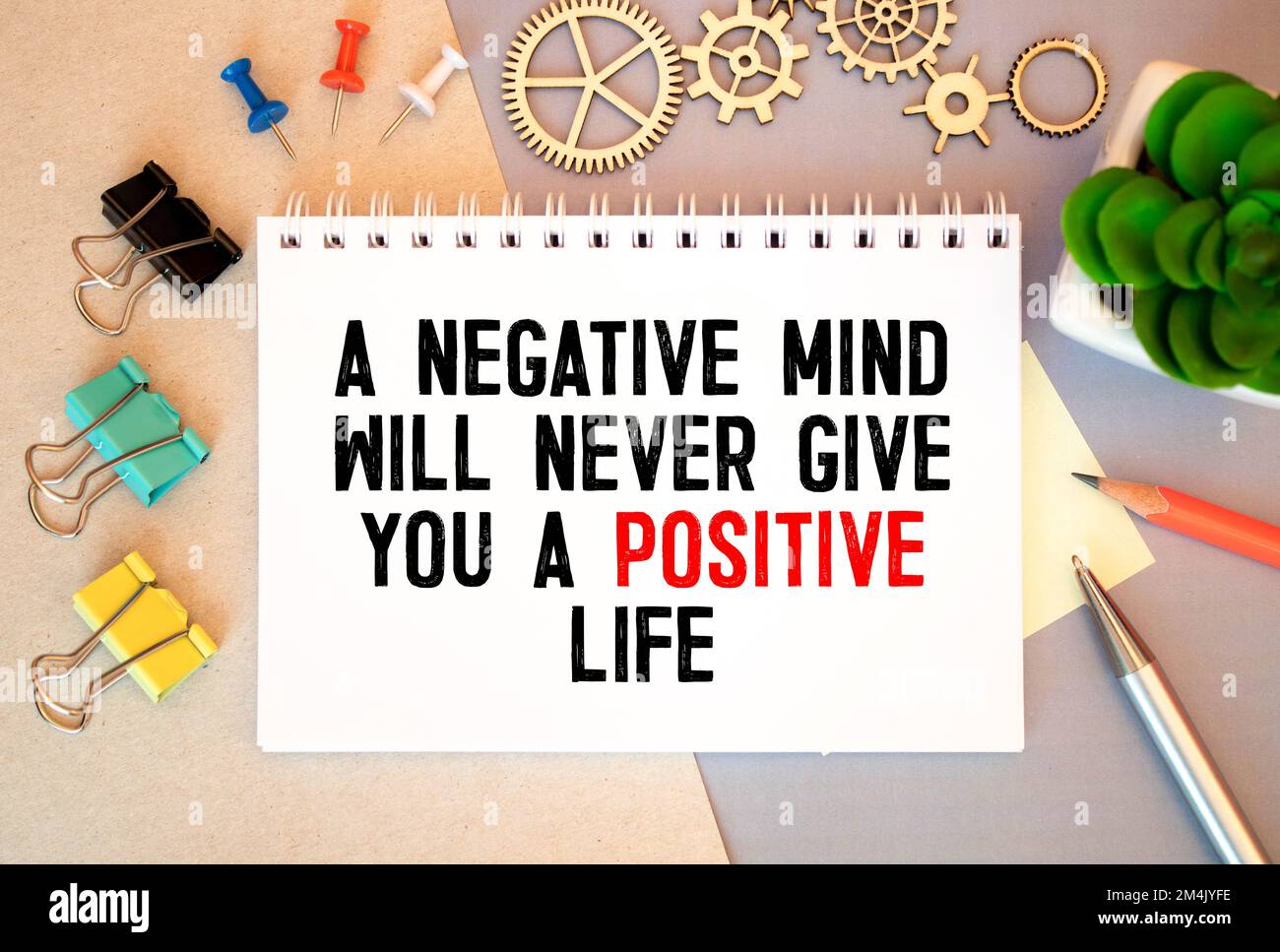 The text A negative mind will never give you a positive life. Motivational quote Stock Photo - Alamy