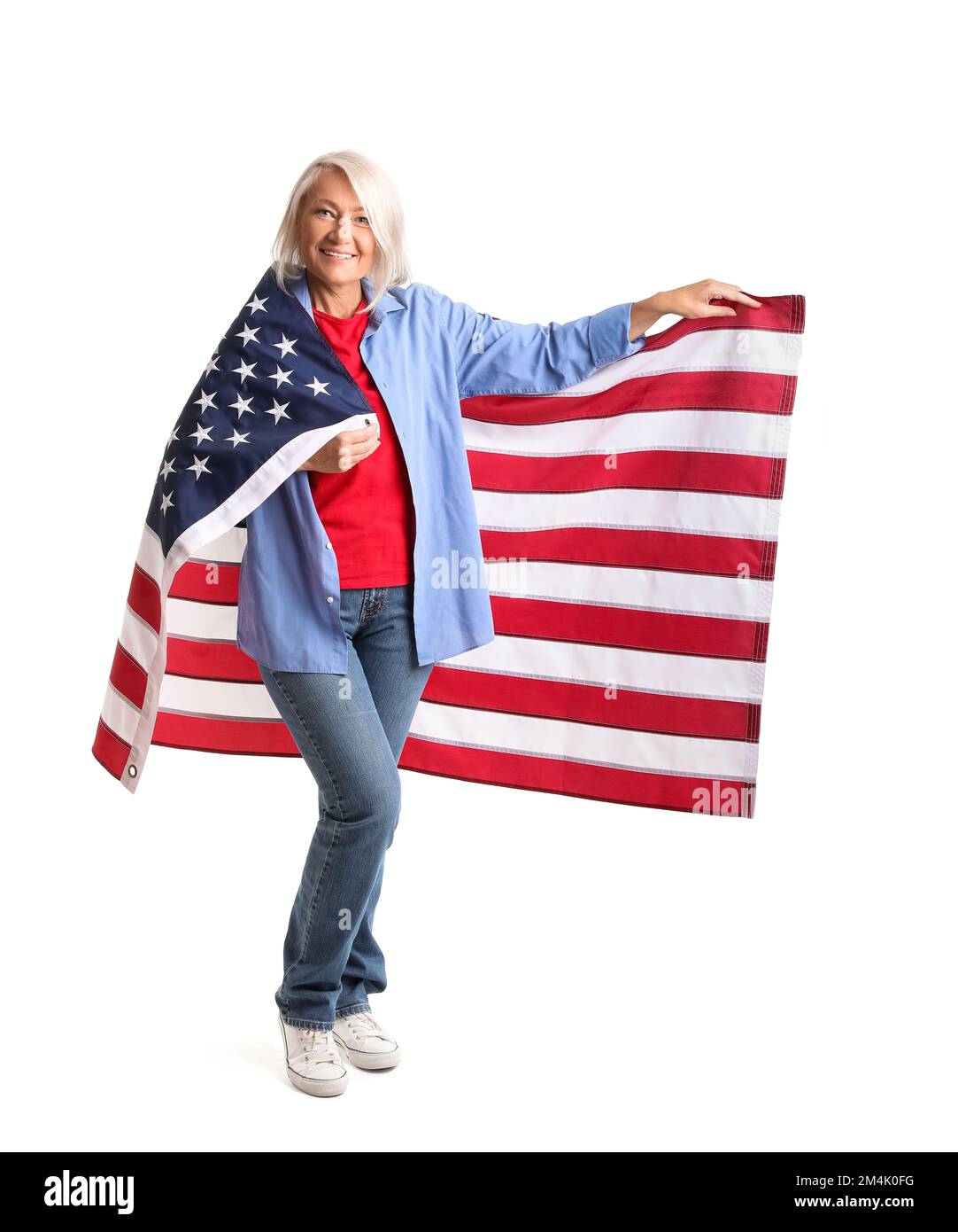 Mature woman with USA flag on white background Stock Photo - Alamy