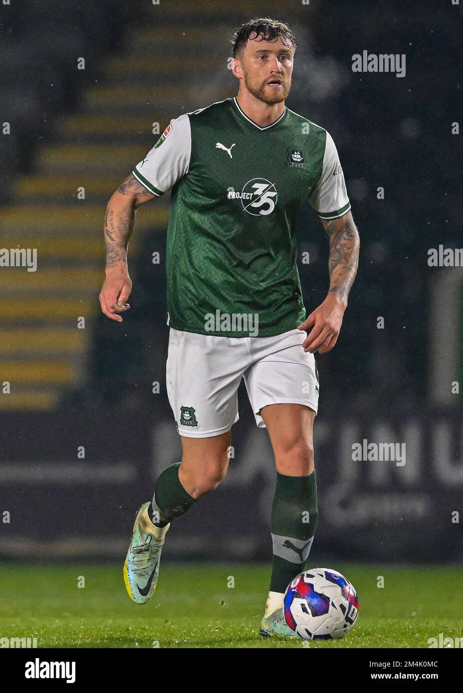 Plymouth Argyle defender Dan Scarr (6) on the ball during the Papa John ...