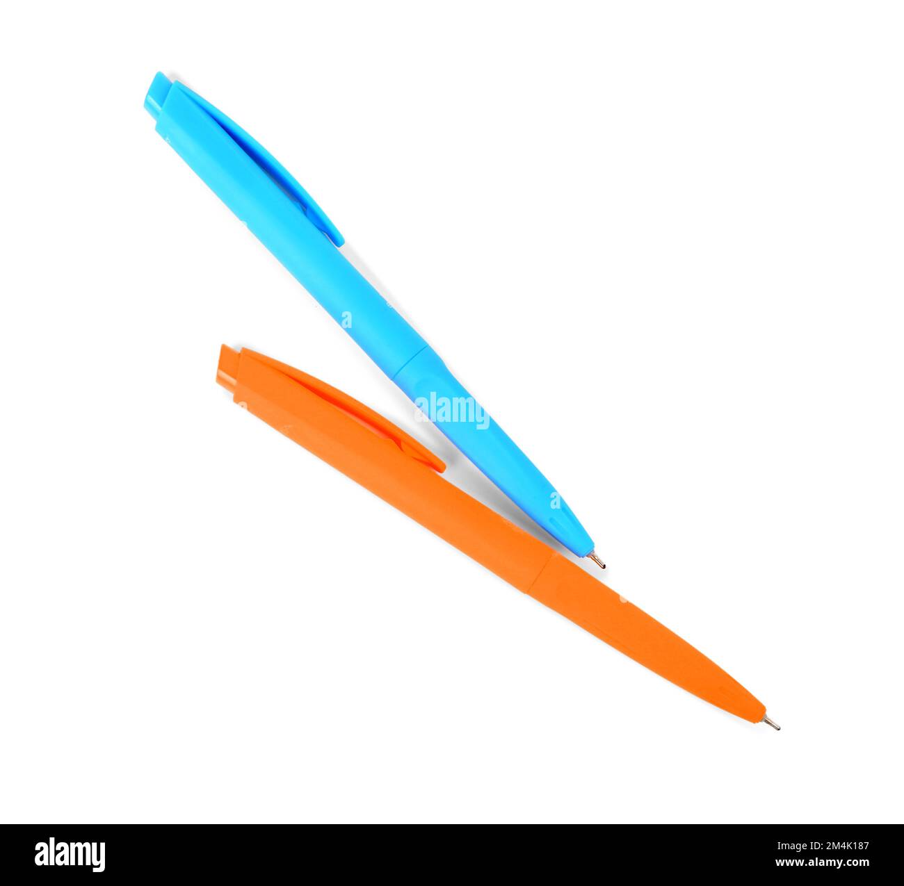 Two pens isolated on white background Stock Photo - Alamy