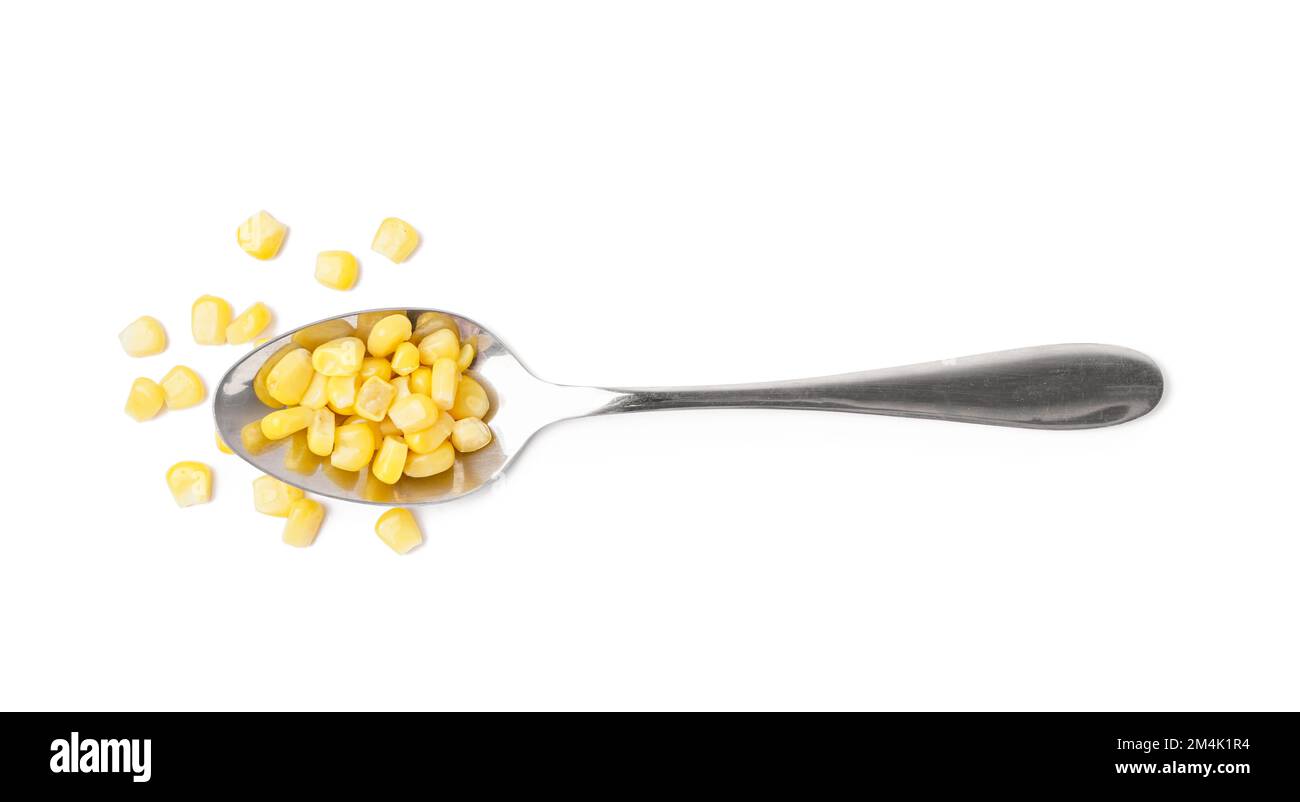 Spoon with canned corn isolated on white background Stock Photo - Alamy