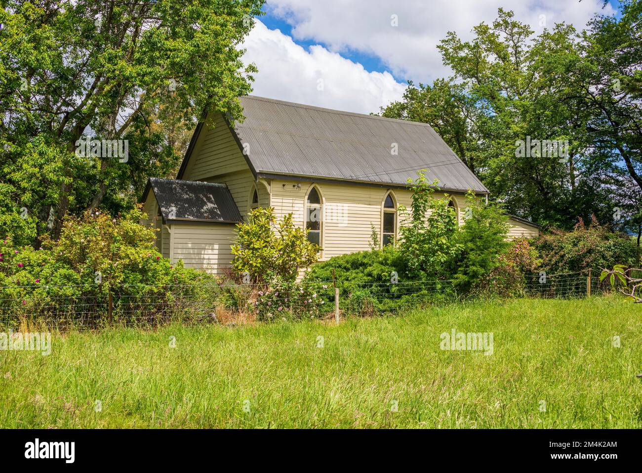 A small country church with timber walls and iron roof in Mid ...