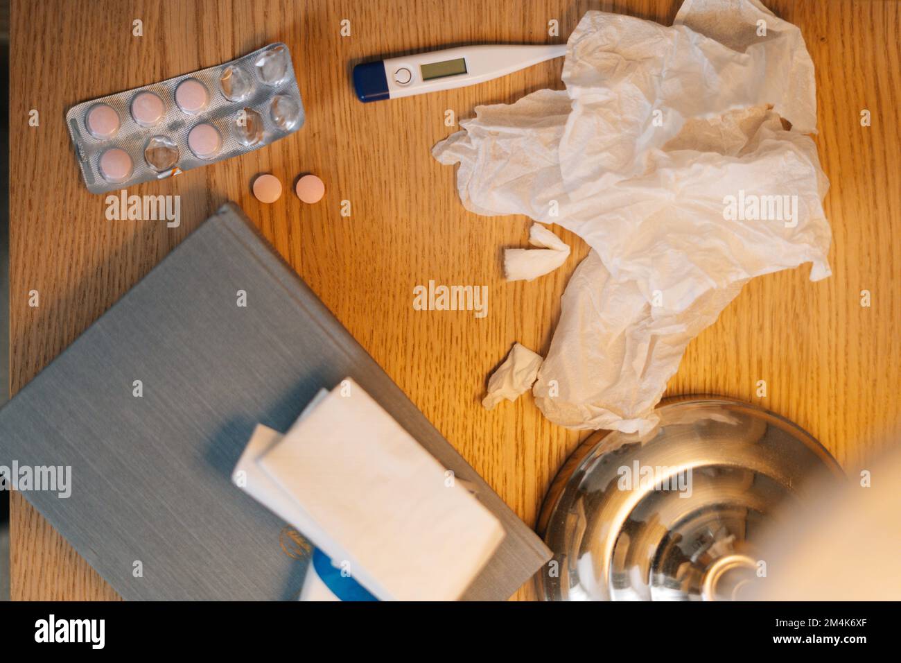 High-angle close-up view of home sickness medical supplies lying on ...
