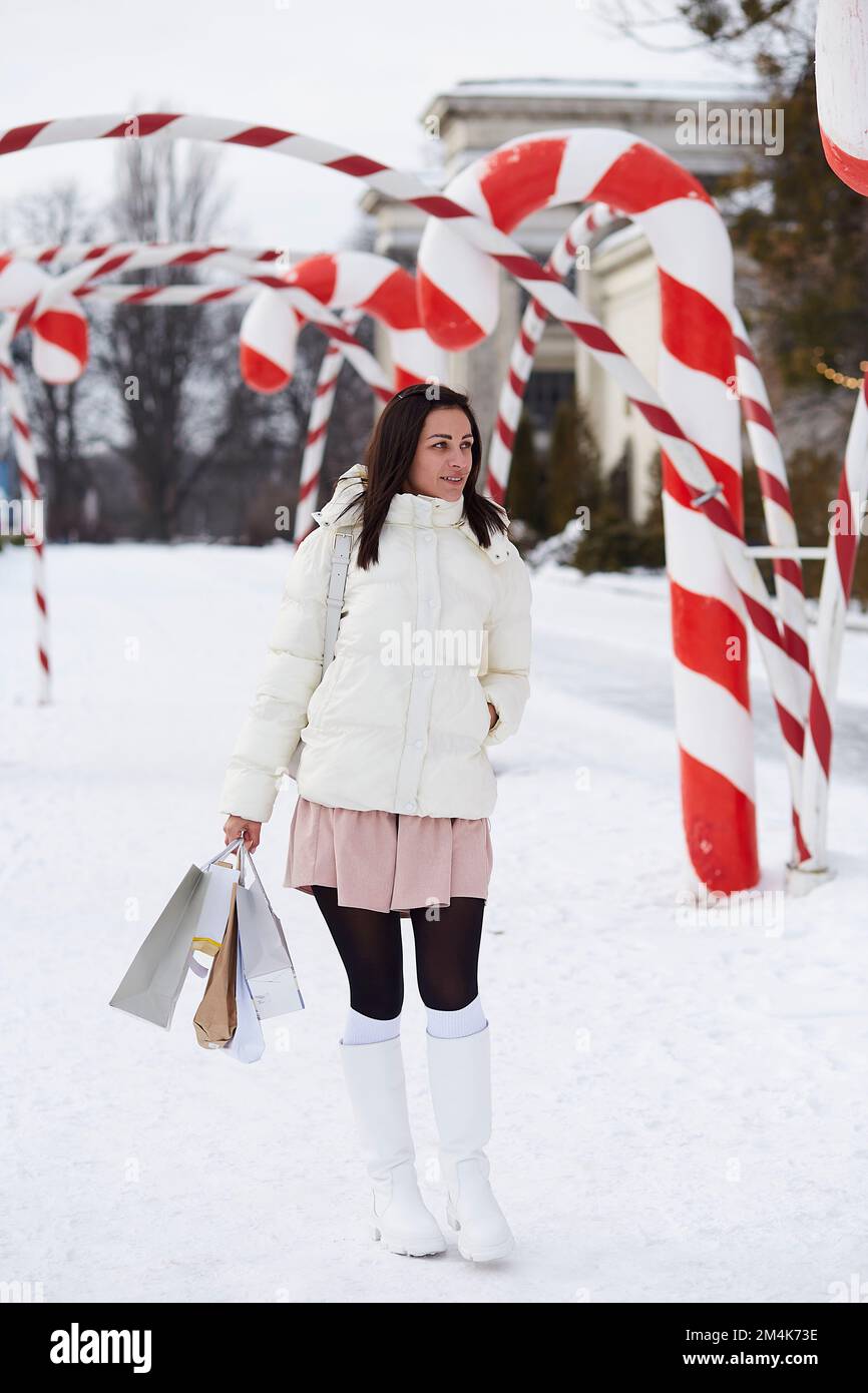 Woman holds christmas packages hi-res stock photography and images - Alamy