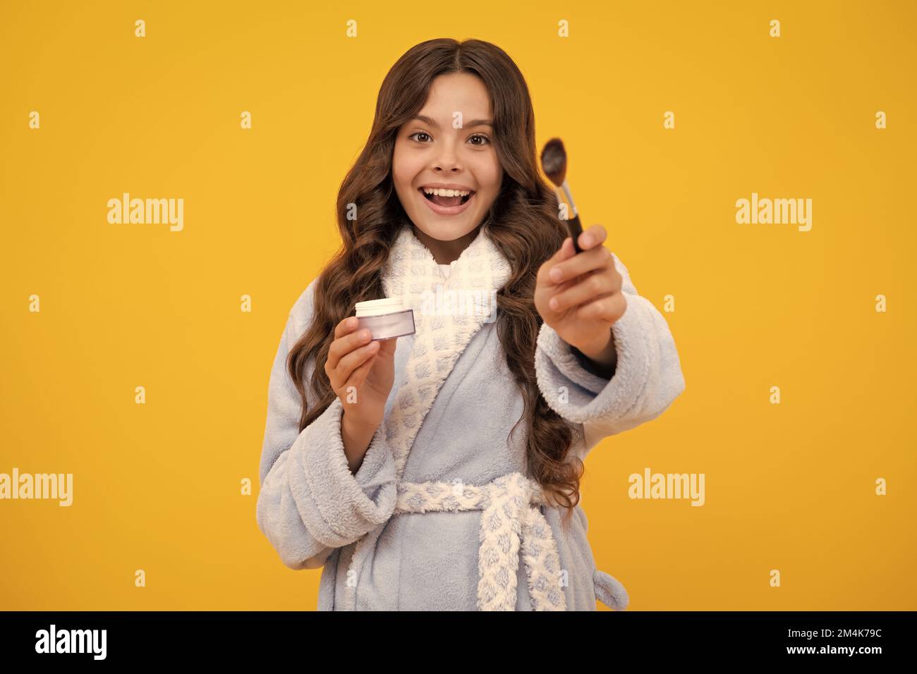 Beautiful portrait of teen girl child artist apply powder with make up ...