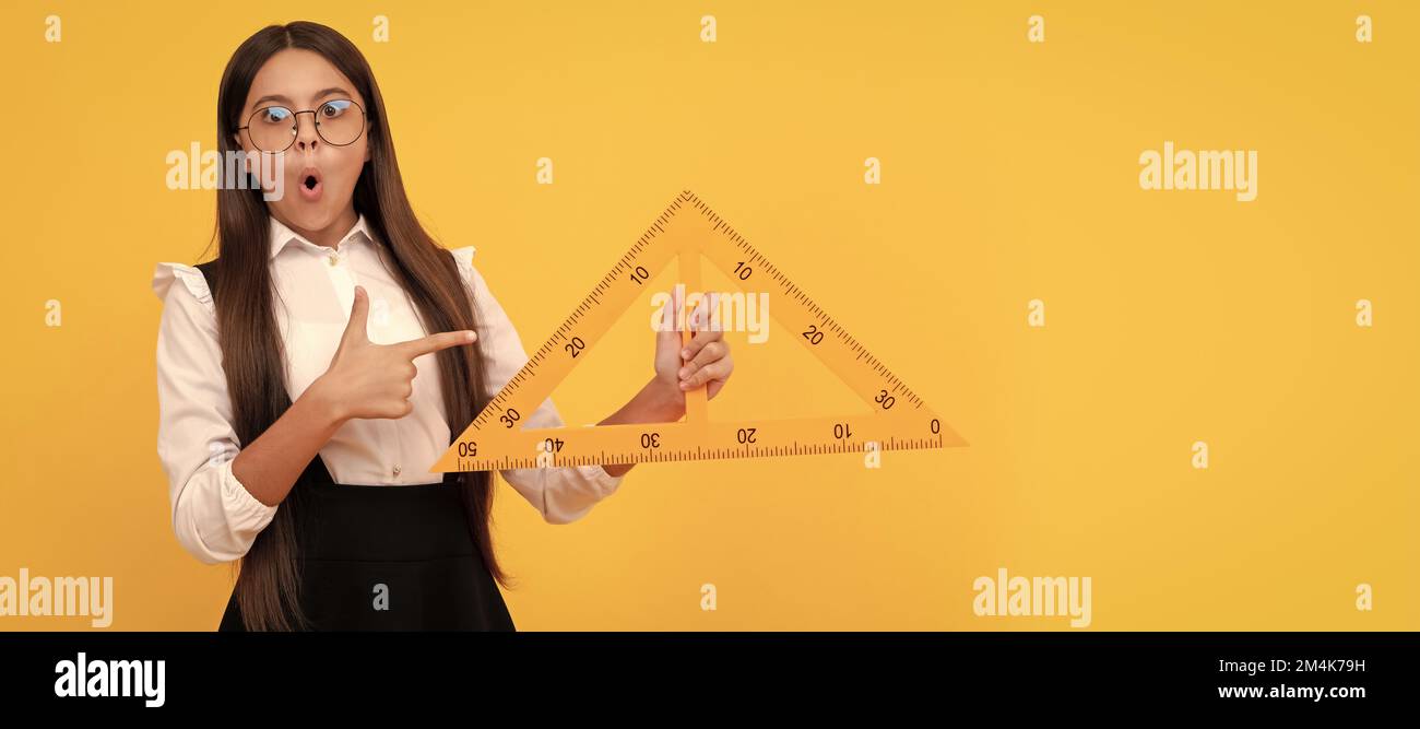 shocked kid in school uniform and glasses pointing finger mathematics ...