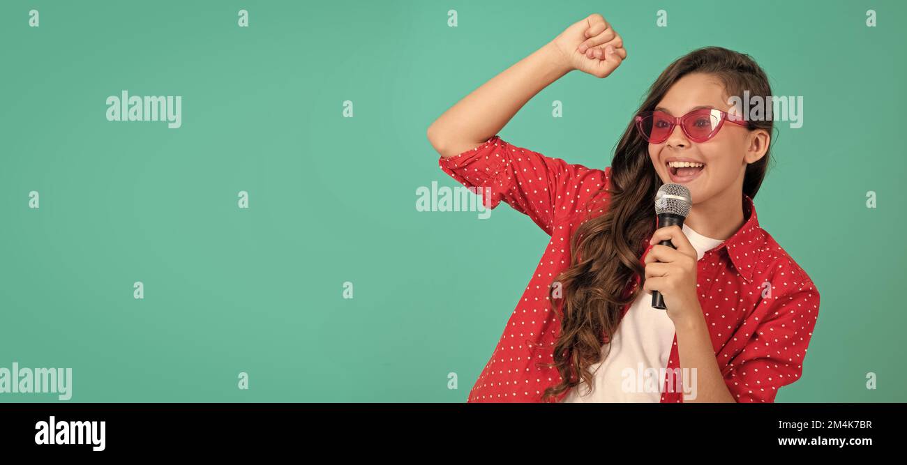 happy teen girl singer blogging online with selfie led and microphone ...