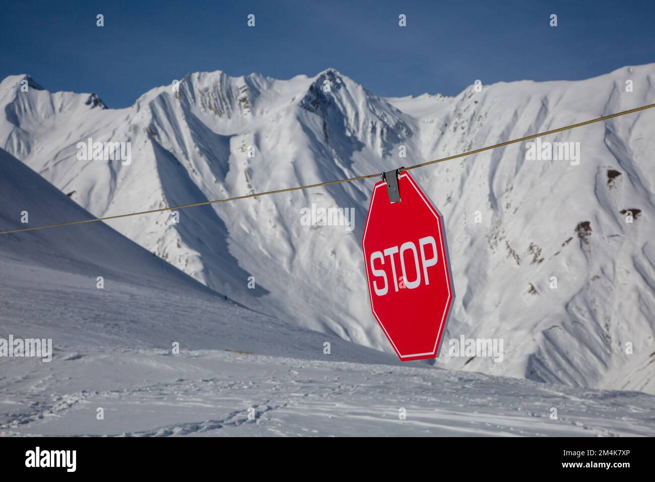 avalanche danger prohibited zone in high mountains, stop sign - no ...