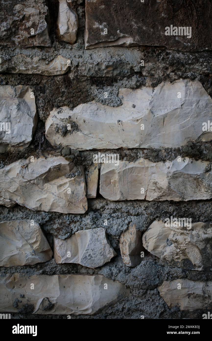 A Twenty year old stone wall in the abandoned Kastri Greek village ...