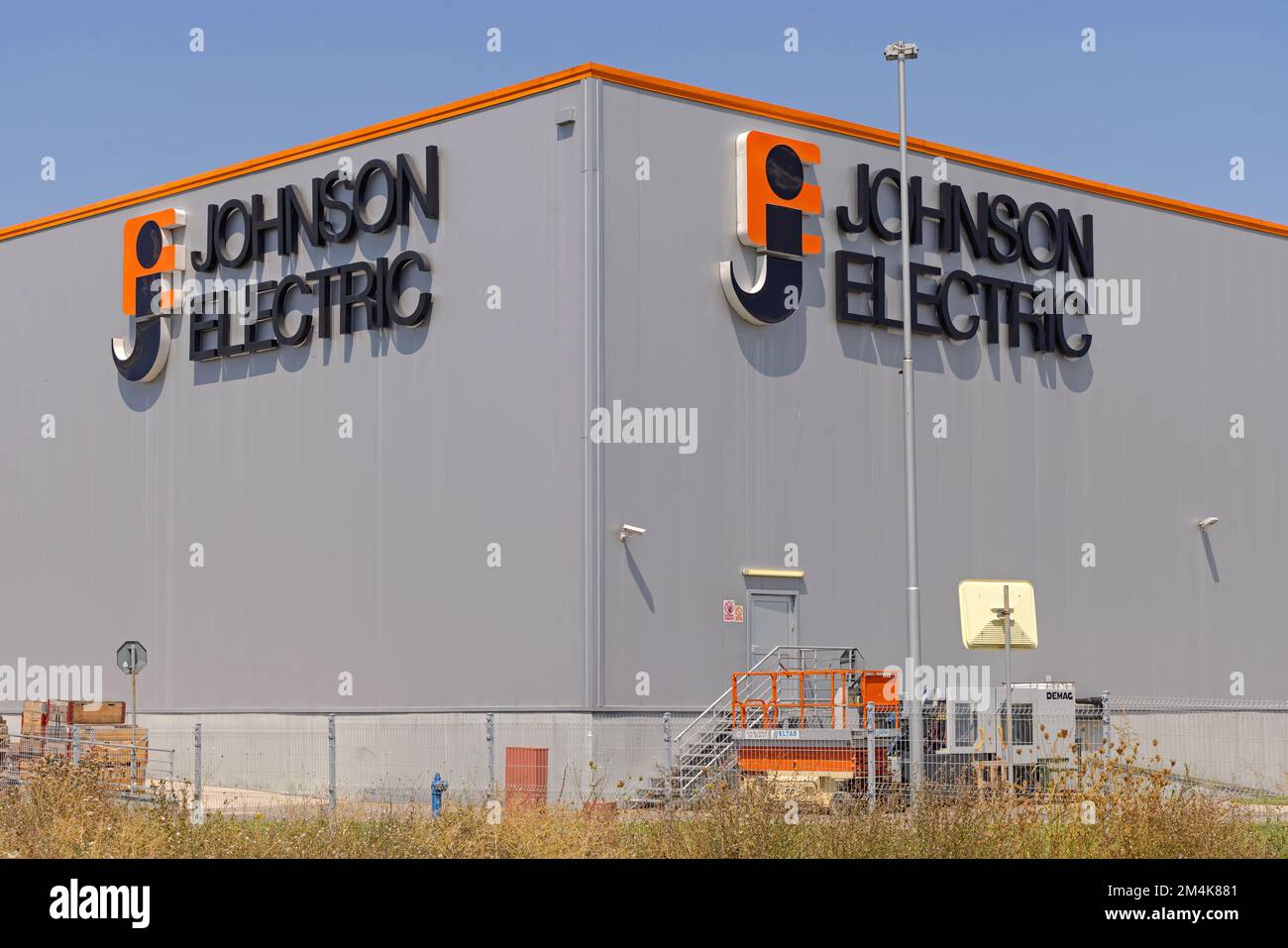 Nis, Serbia - August 04, 2022: Johnson Electric Factory Car Parts Manufacturer Logo Signs at ...