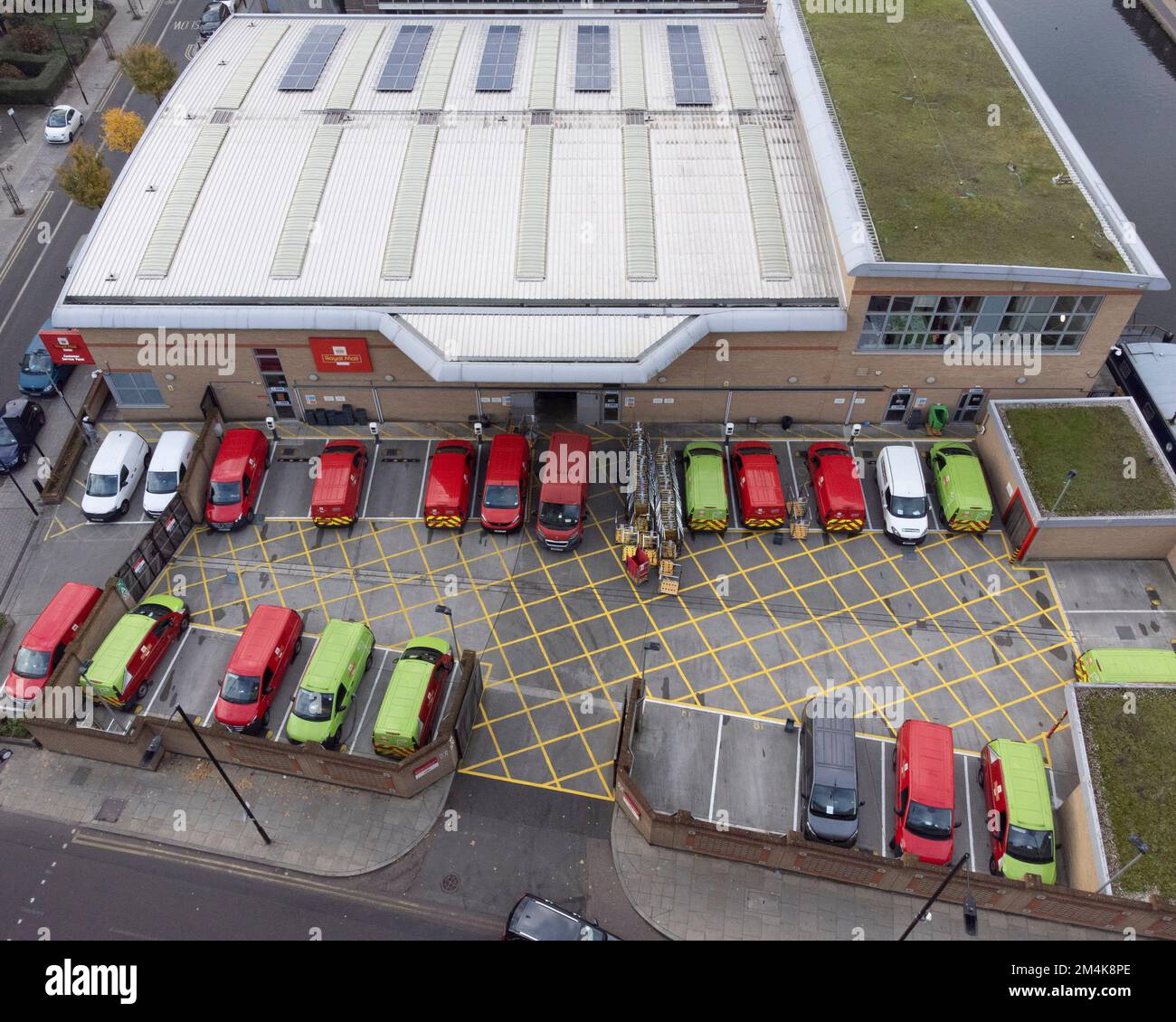 Mail delivery vans are parked at Royal Mail Islington Delivery Office ...