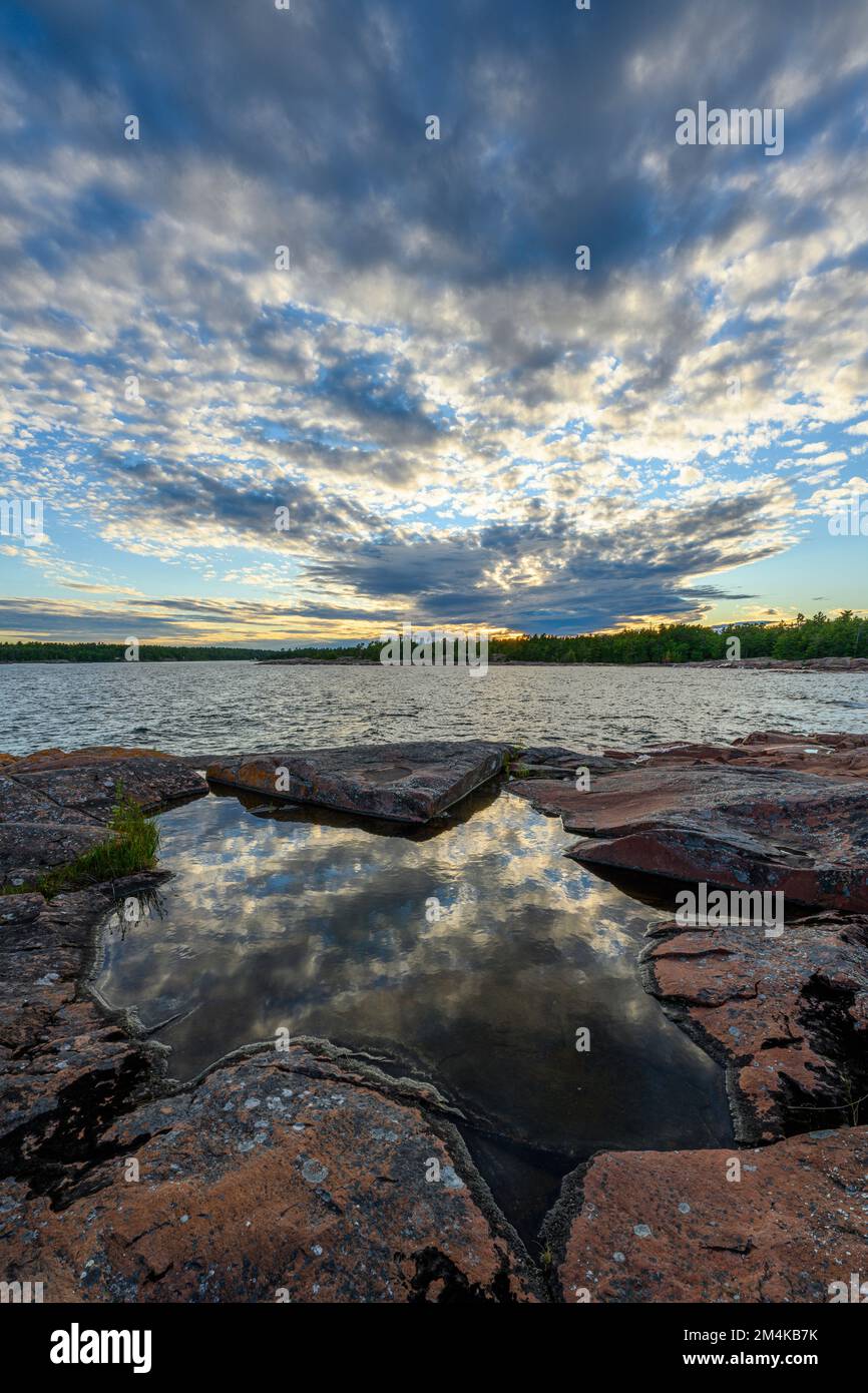 Sunset clouds over Georgian Bay , Killarney, Ontario, Canada Stock ...