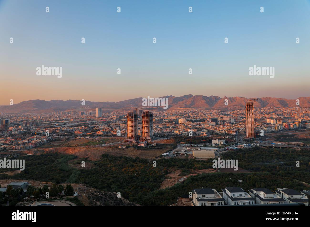 An aerial view of the Duhok city with its skyscrapers and twin towers ...