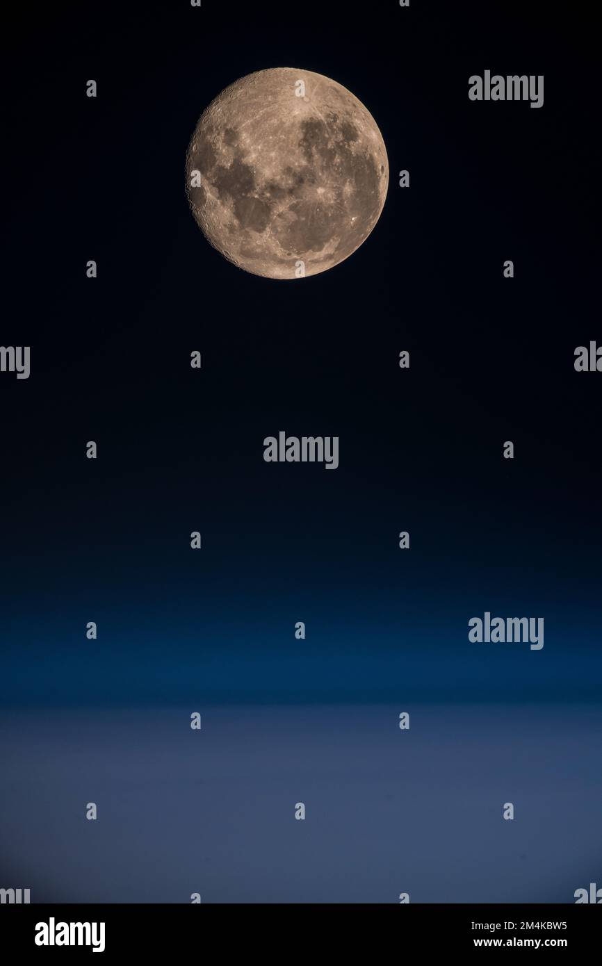 View of a full moon over the Pacific Ocean from the international space ...