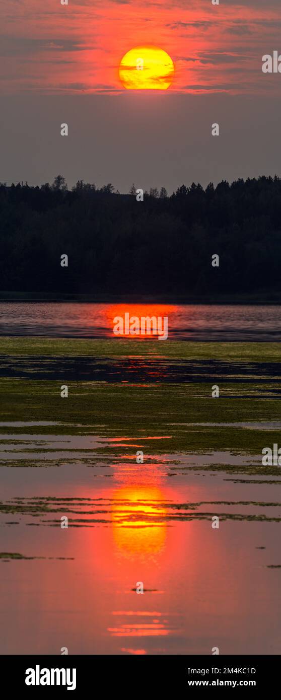 Hazy summer sunset over Kelly Lake, Greater Sudbury, Ontario, Canada ...