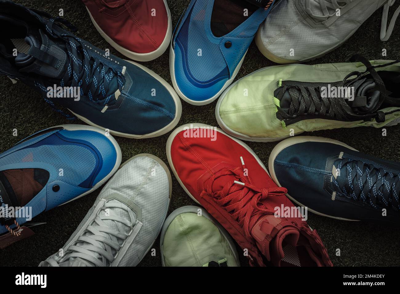 Various sport shoes joining together for Unity and way to victory ...