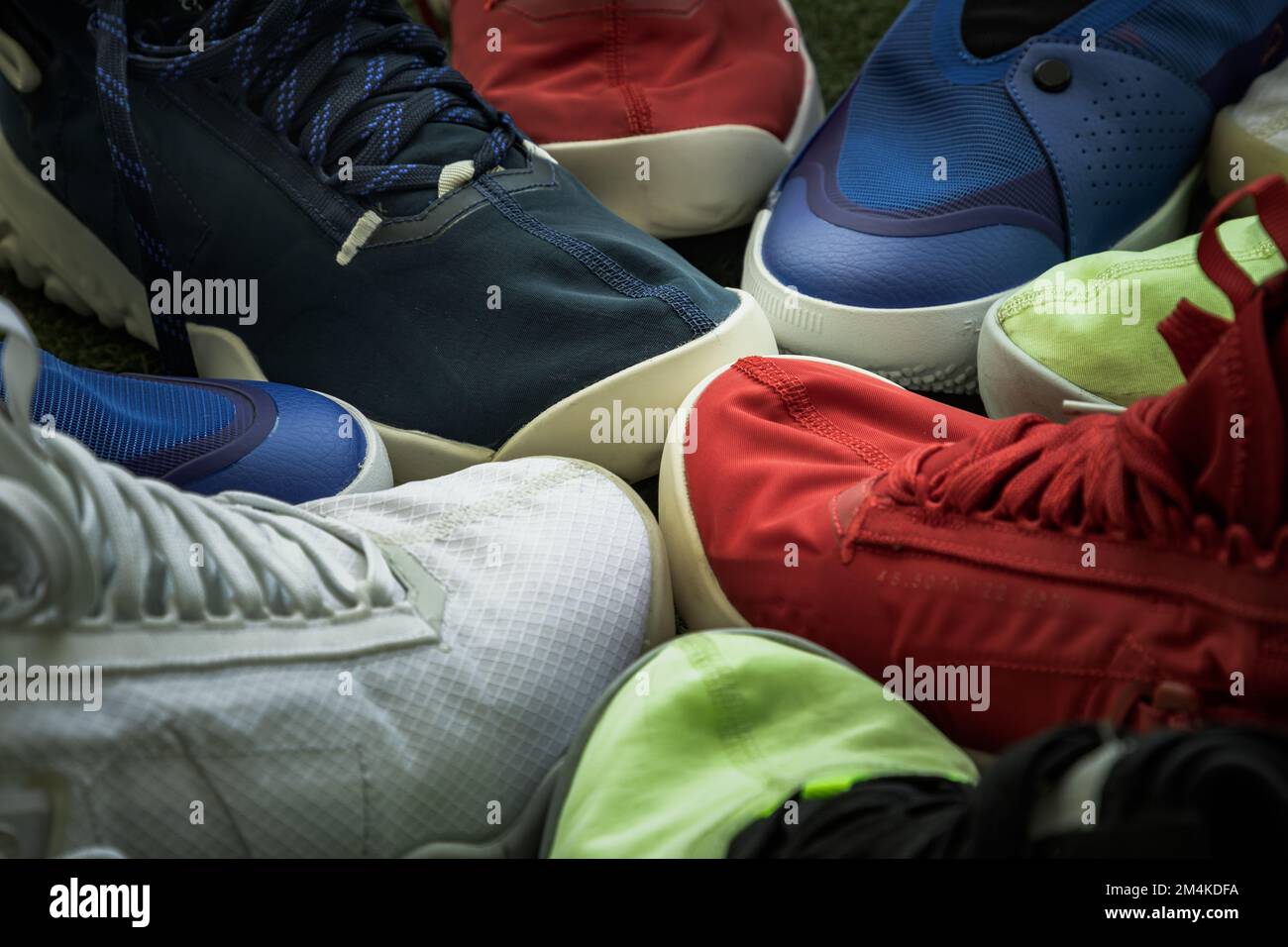 Various sport shoes joining together for Unity and way to victory ...