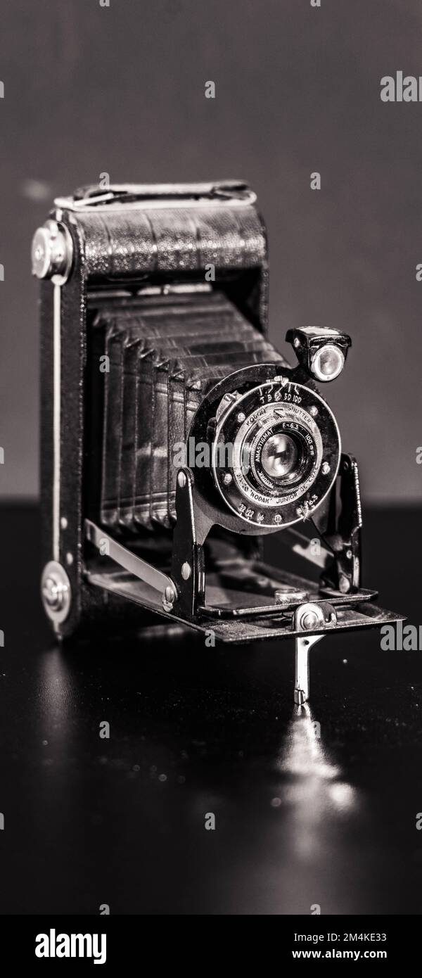 A vertical greyscale shot of a vintage camera from England Stock Photo ...