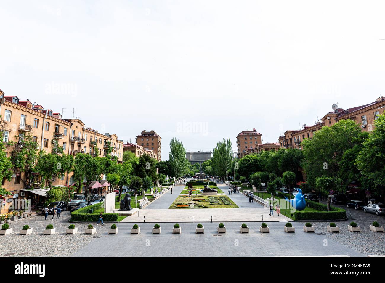 A beautiful cascade with traditional red buildings and statues in ...