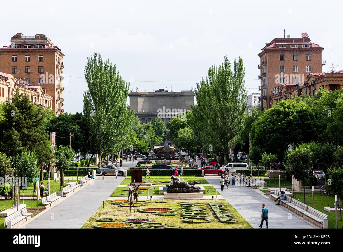 A beautiful cascade with traditional red buildings and statues in ...