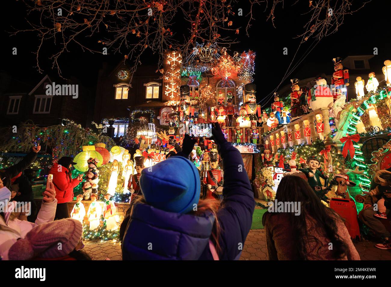 Christmas decorations and lights on display at a the Dyker Heights in ...