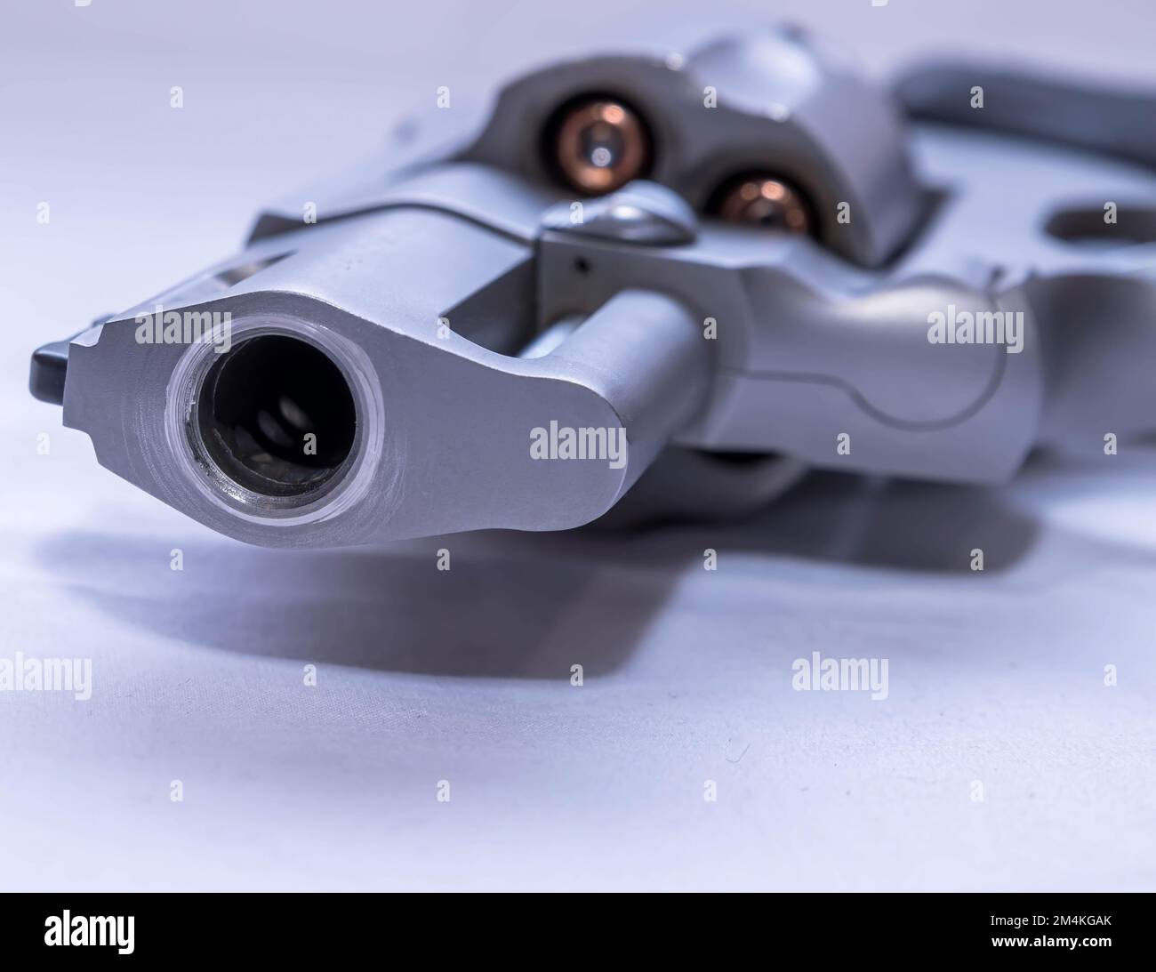 The muzzle of a 454 casull snub nose revolver loaded with hollow point ...