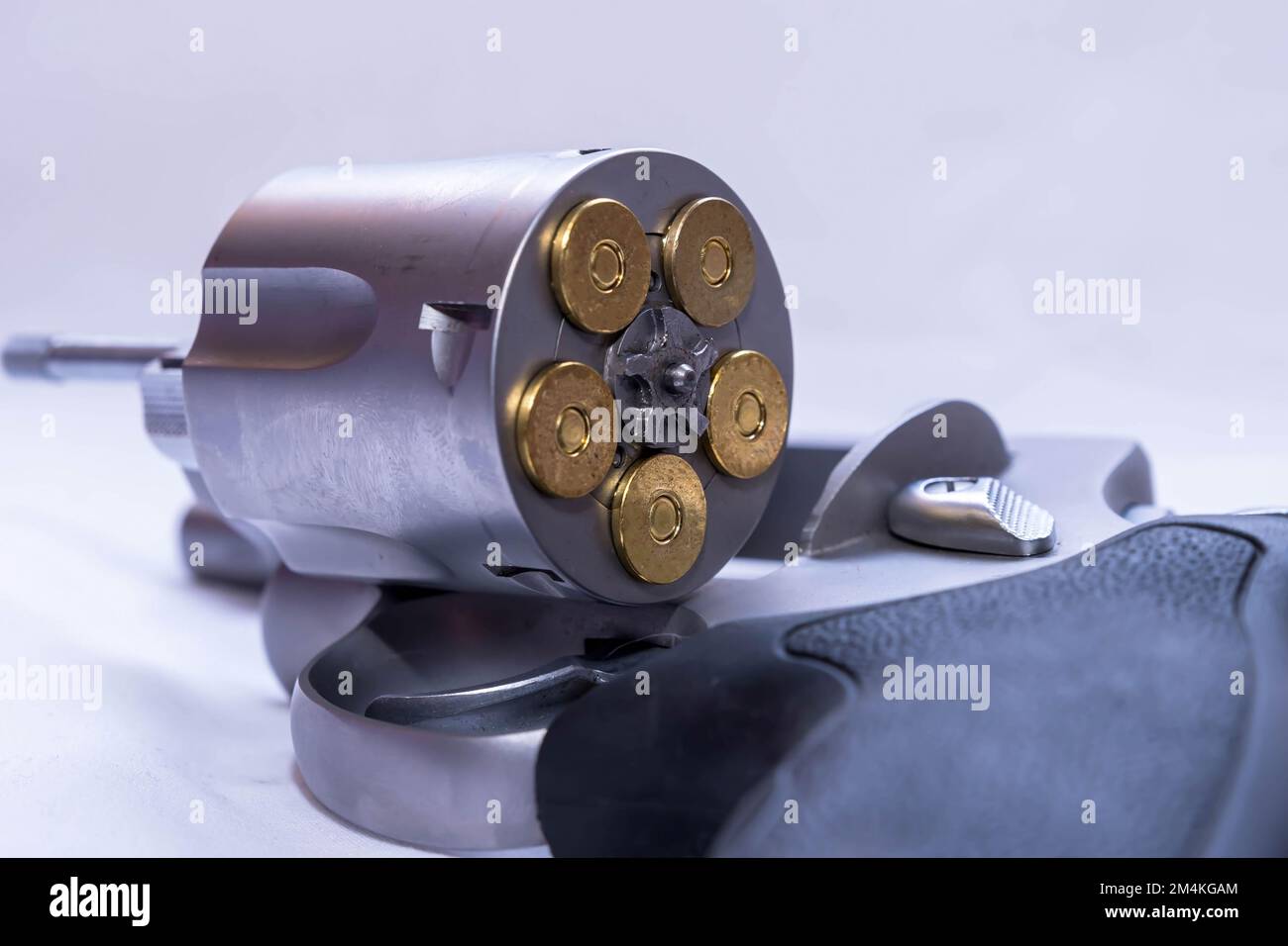 A stainless steel, snub nose 454 casull revolver, with the cylinder ...