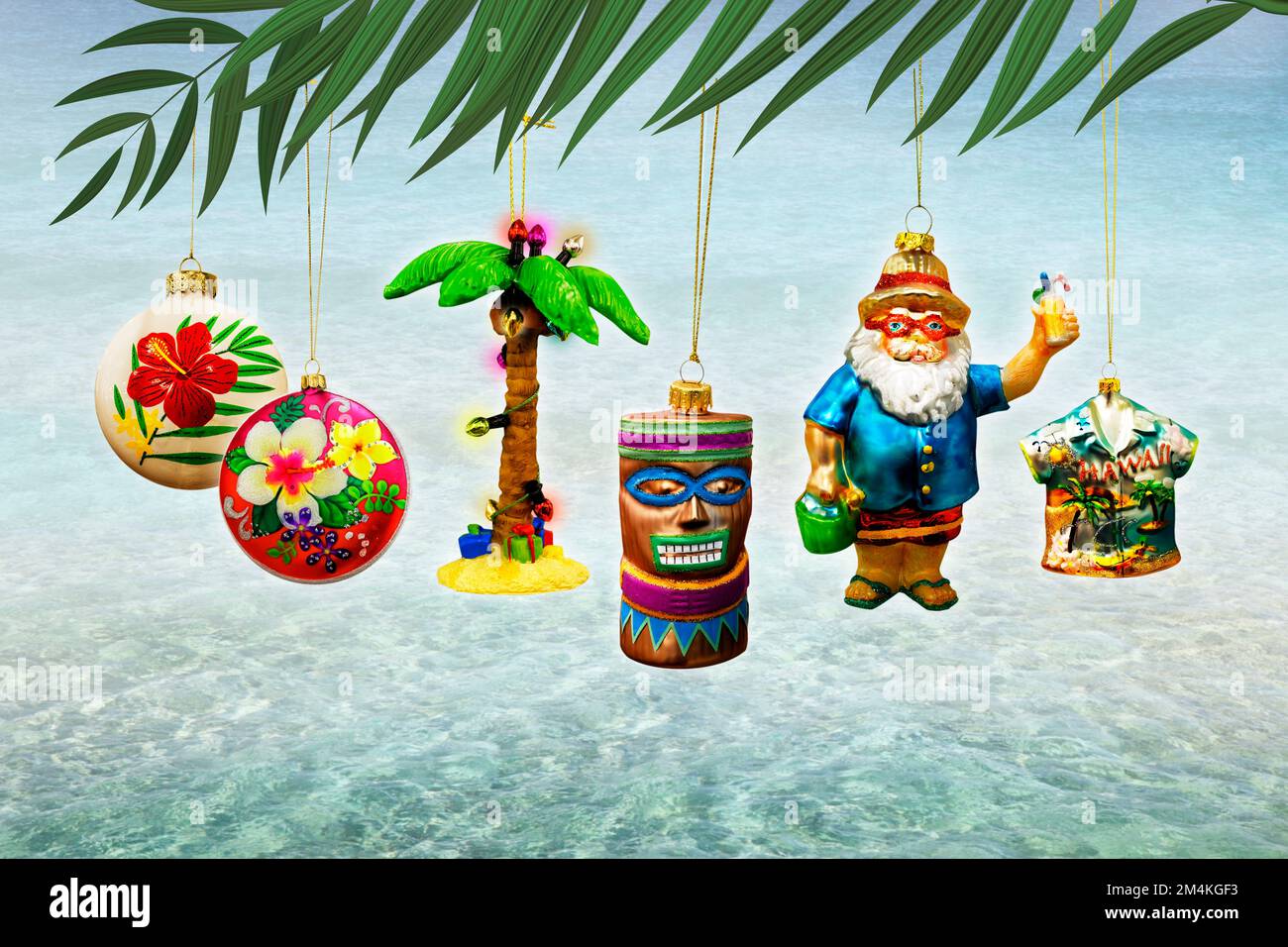 Christmas holiday ornaments in Hawaii with tropical beach background ...