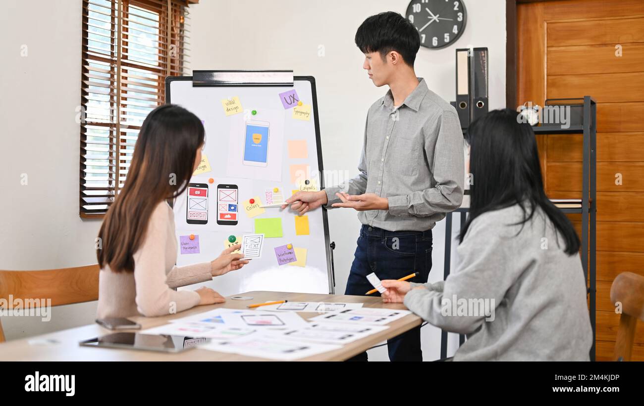 Professional young Asian male software developer presenting his ...