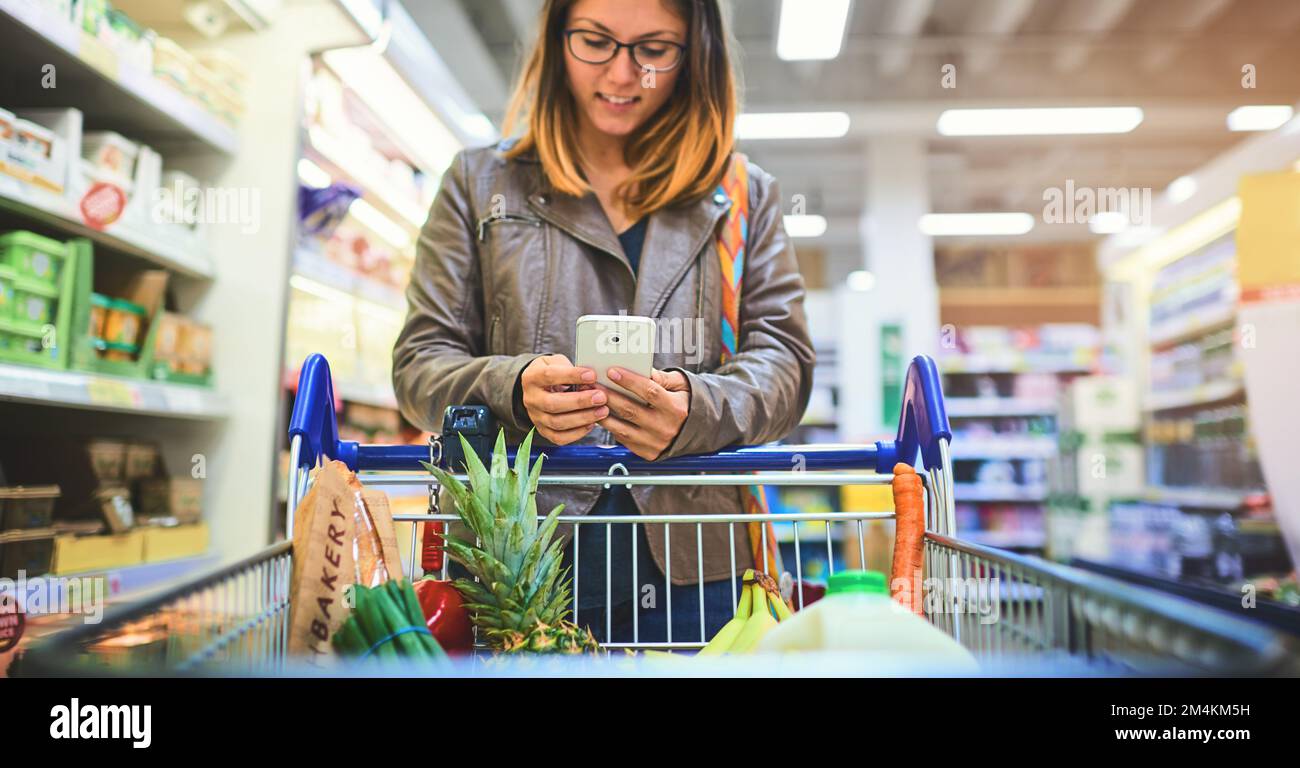 Theres always time for social media, even when grocery shopping. a ...