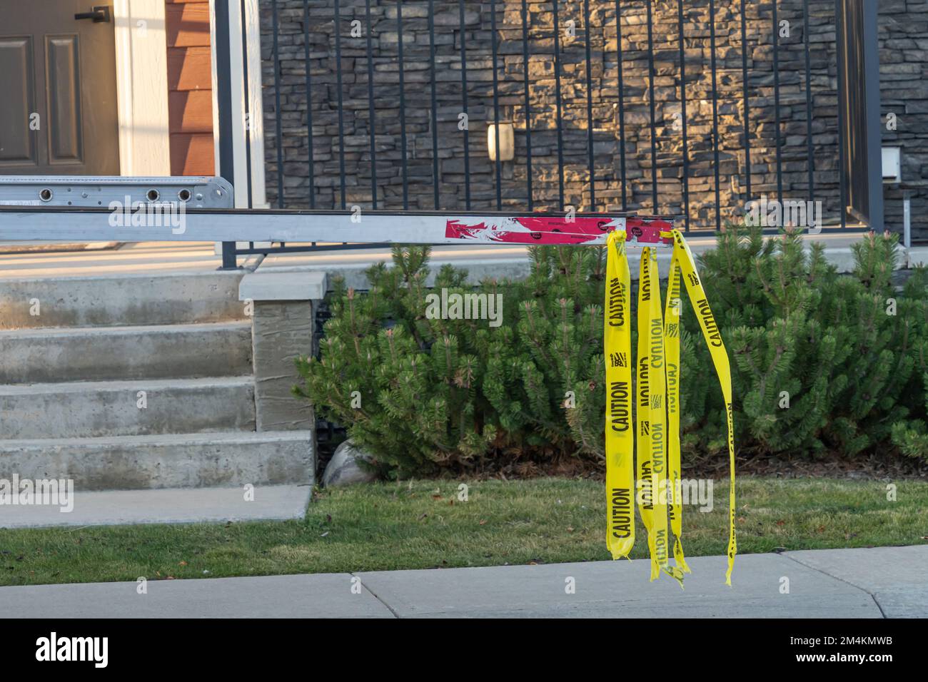 Ladder hanging out of truck with yellow caution tape Stock Photo - Alamy