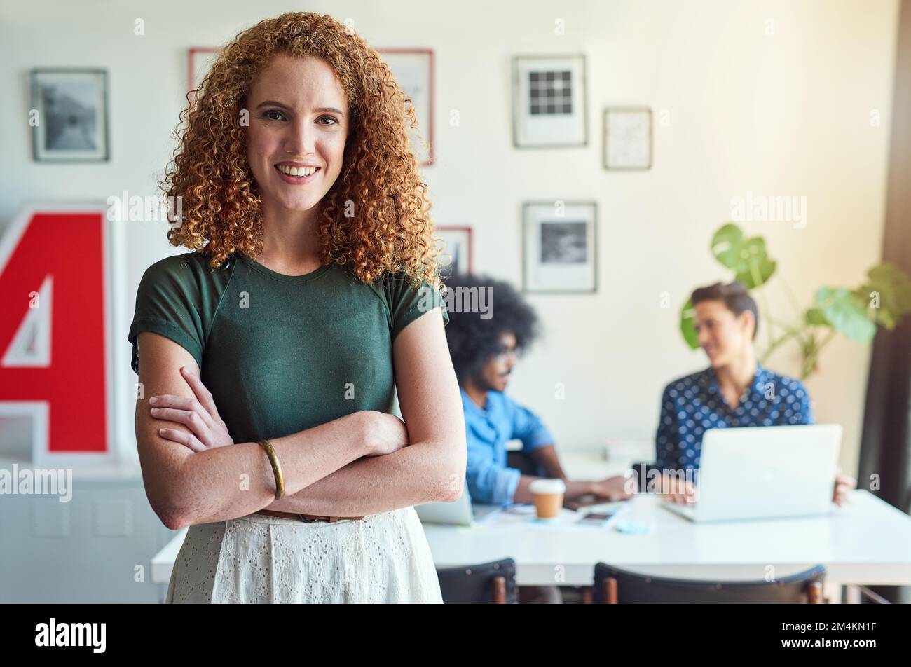 Designing is what she loves to do. Portrait of a creative employee ...